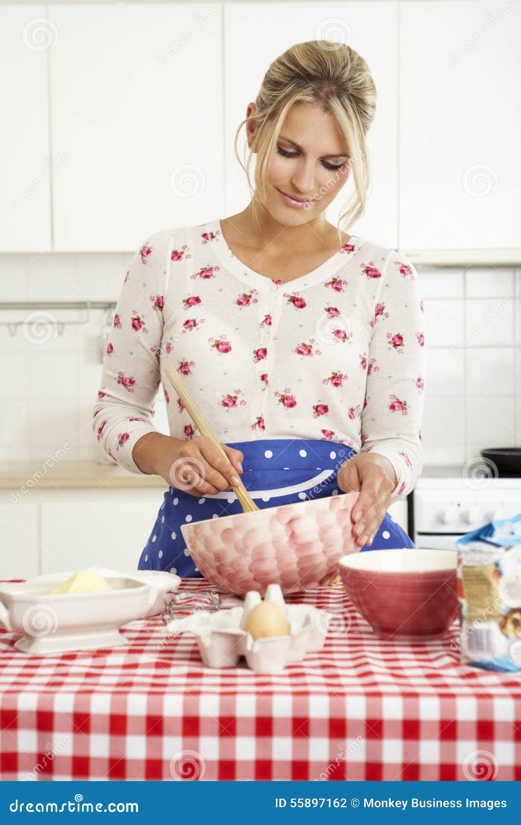 Woman Baking in Kitchen stock photo. Image of adult, vertical - 55897162