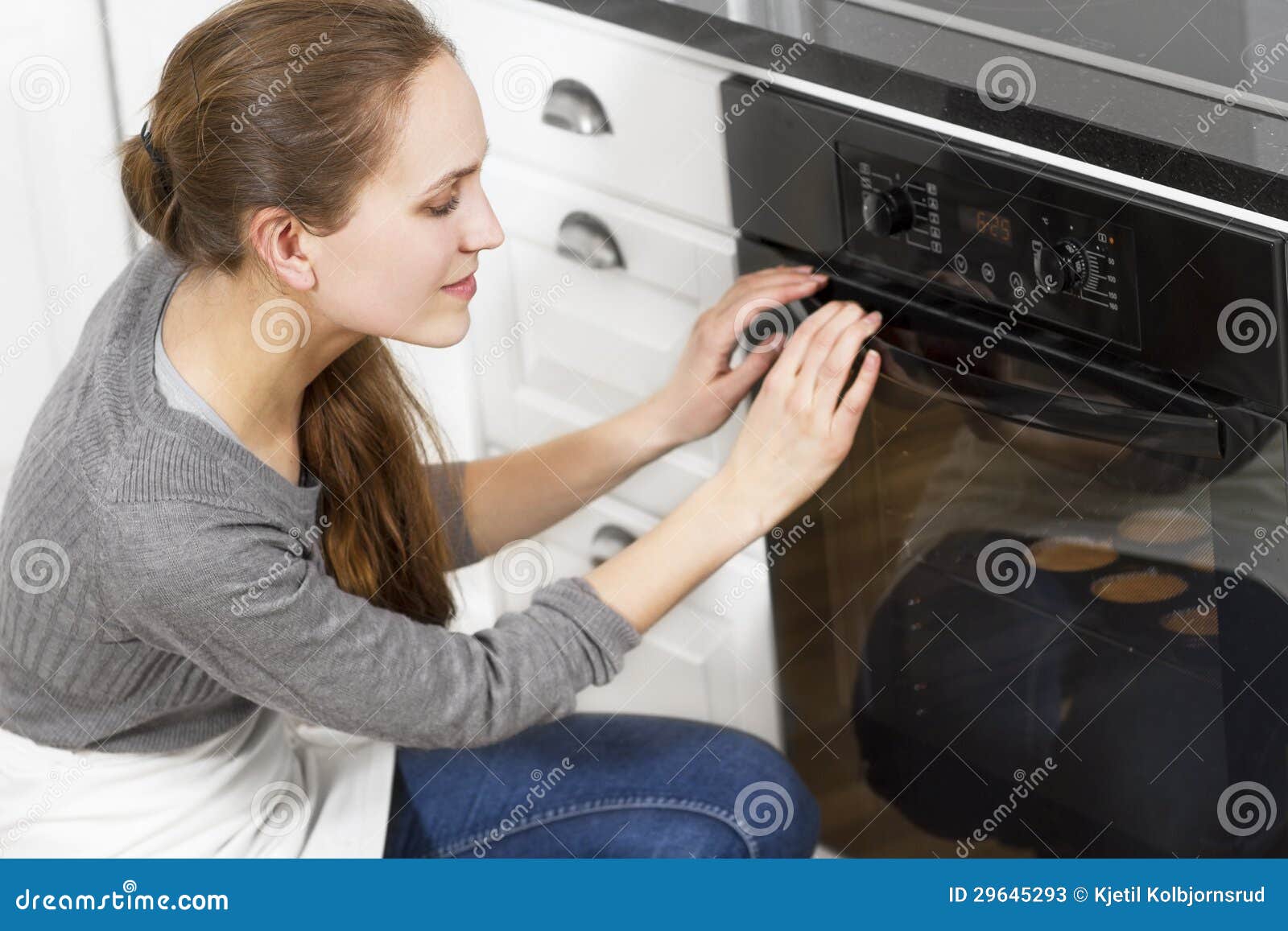Woman Baking Muffins stock image. Image of standing, exclusive - 29645293