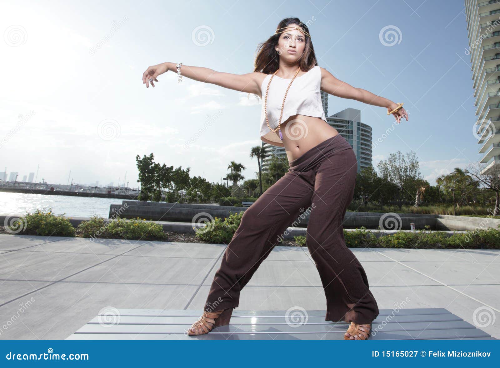 Woman balancing on a bench stock image. Image of person - 15165027
