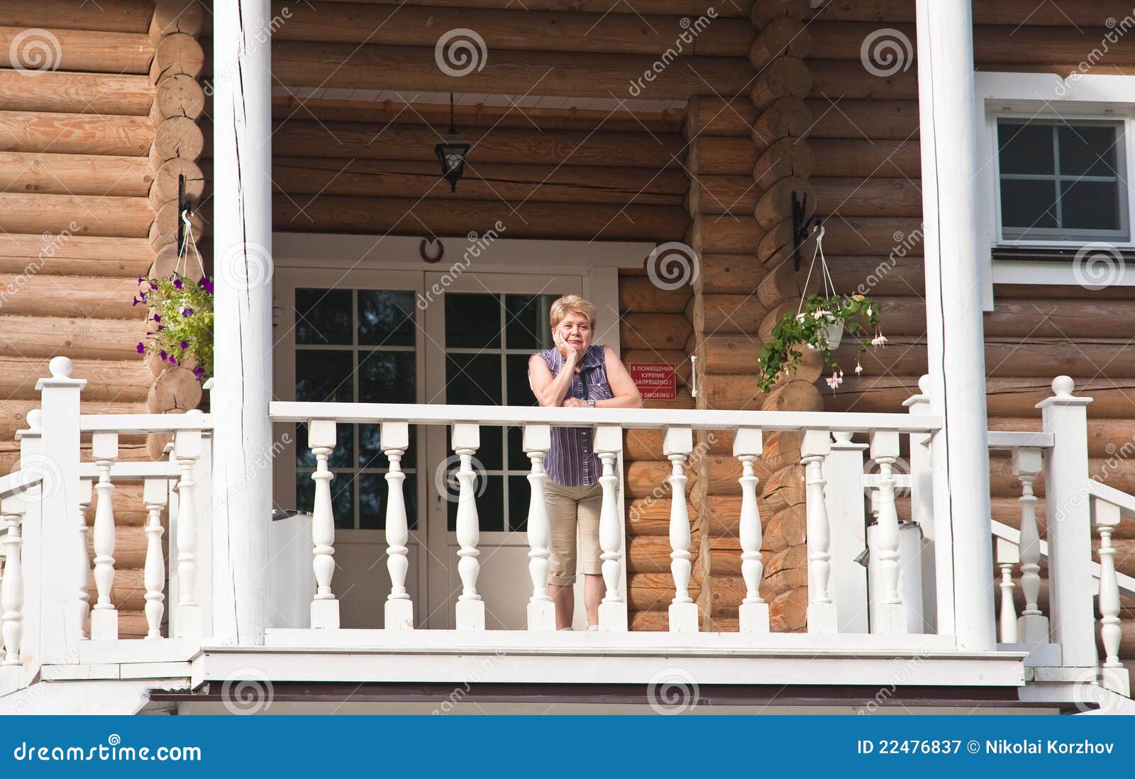 The woman on the balcony stock image. Image of tree, terrace - 22476837