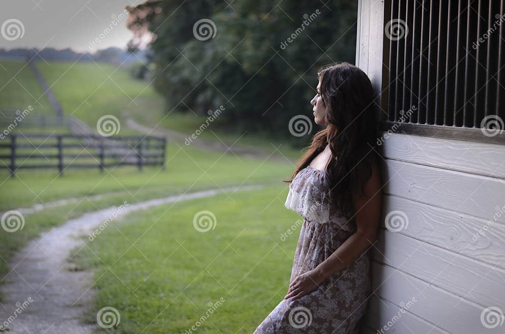 Woman in a Barn stock photo. Image of sunset, serious - 29370672