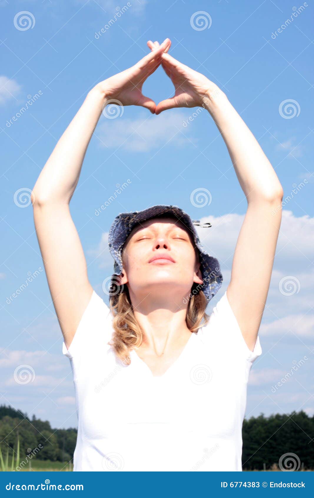 Woman basking in the sun stock image. Image of light, meditation - 6774383