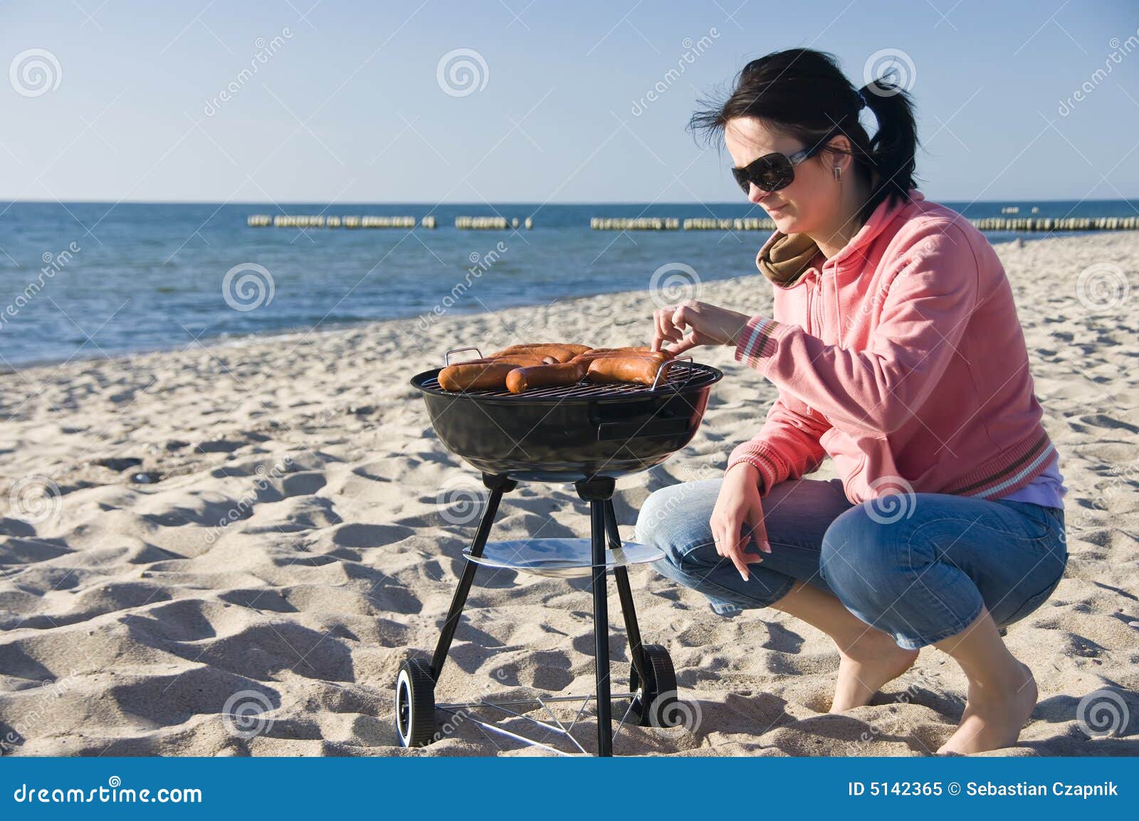 Woman and beach barbecue stock image. Image of sausages - 5142365