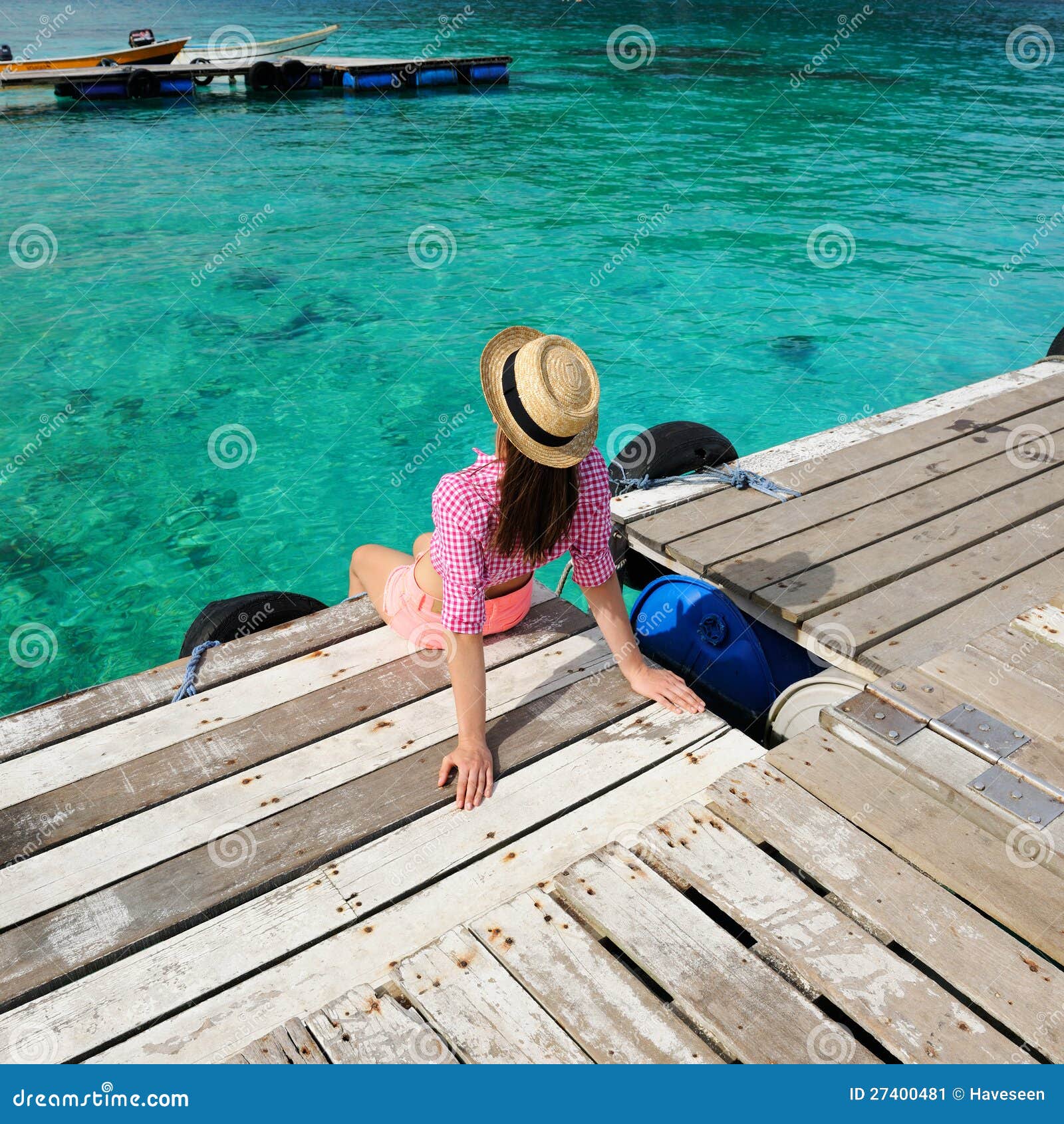 Woman at beach jetty stock image. Image of pier, beach - 27400481