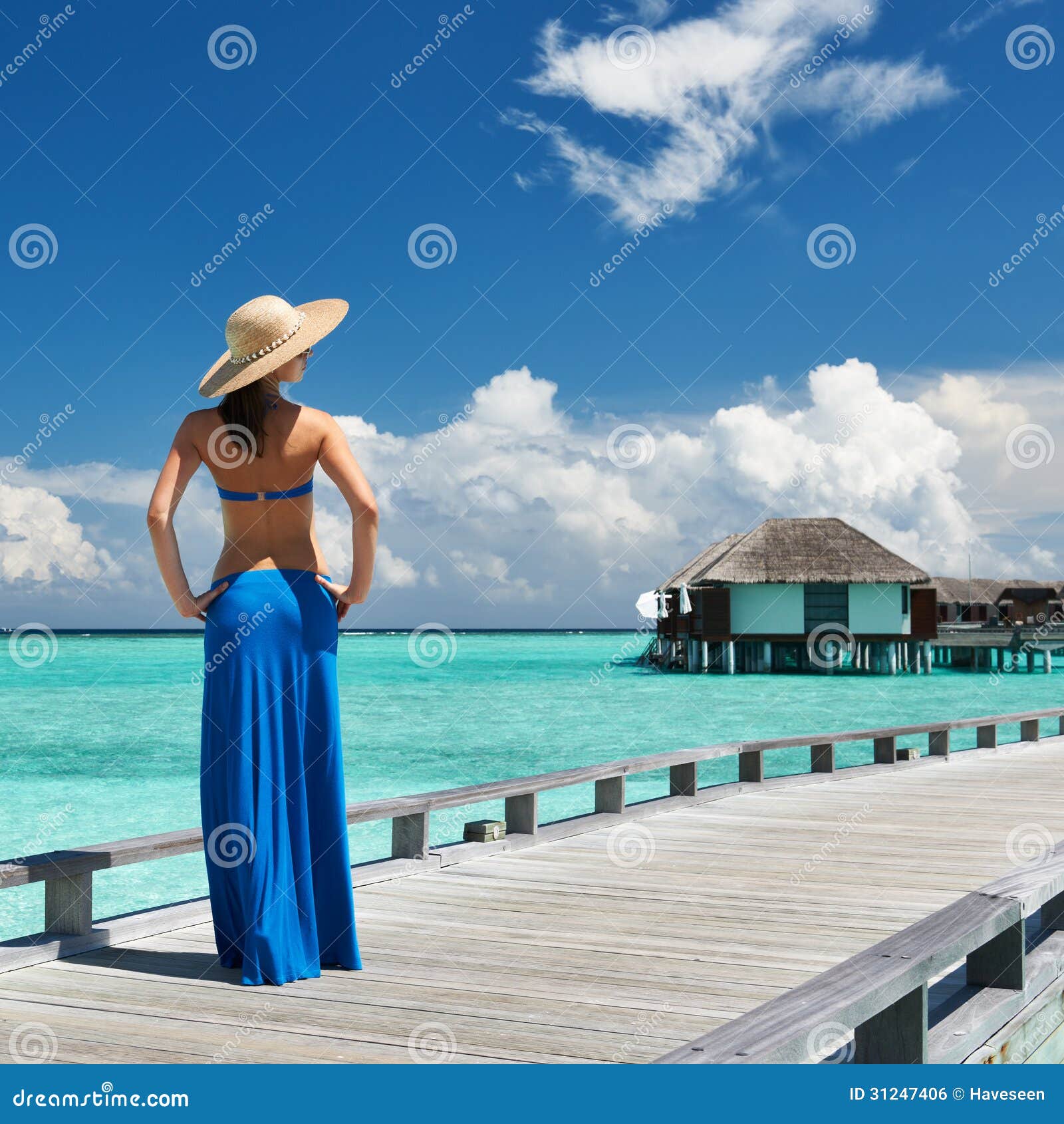 Woman on a Beach Jetty at Maldives Stock Photo - Image of jetty, blue ...