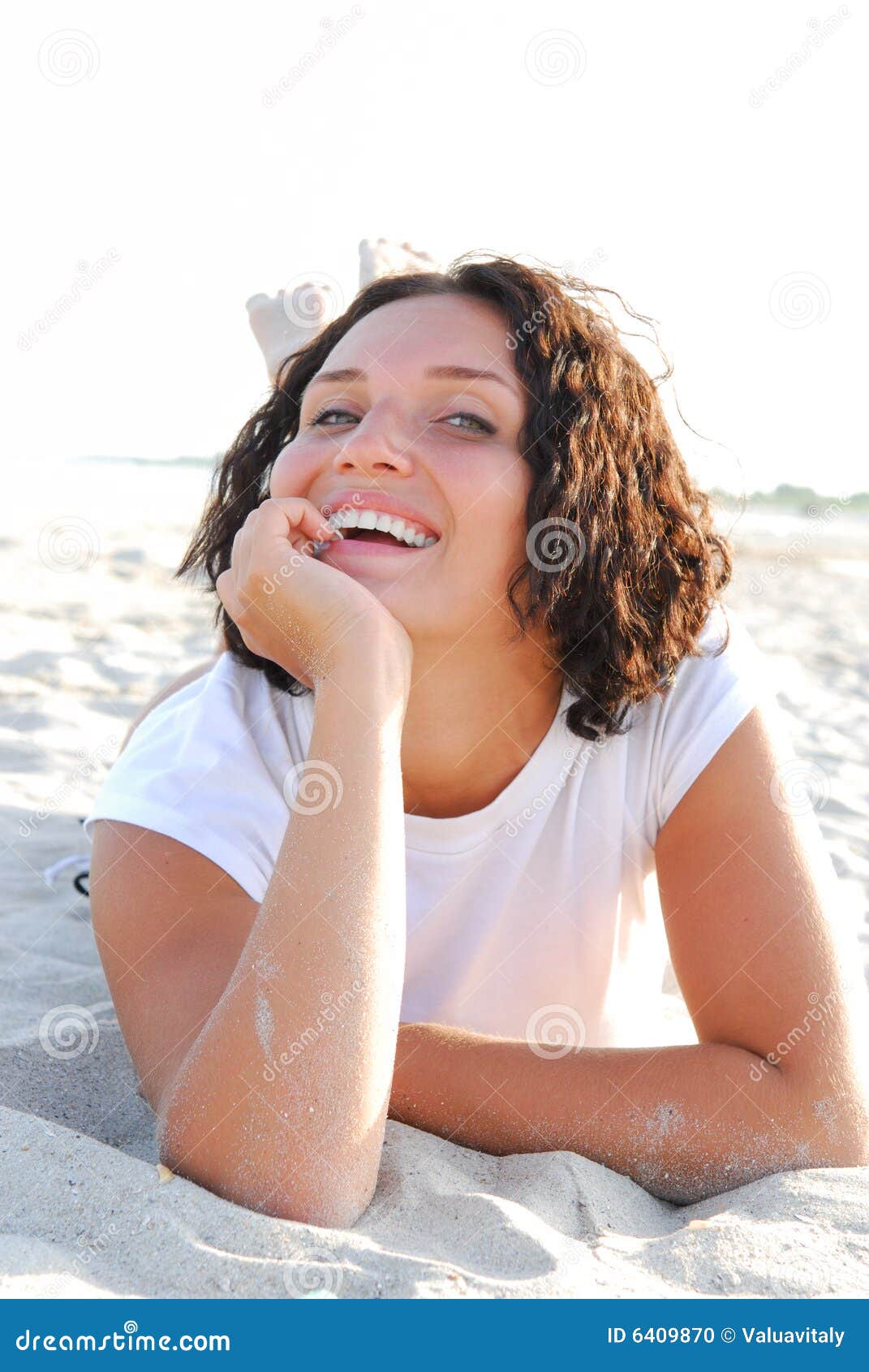 Woman on beach smiling stock photo. Image of leans, contented - 6409870