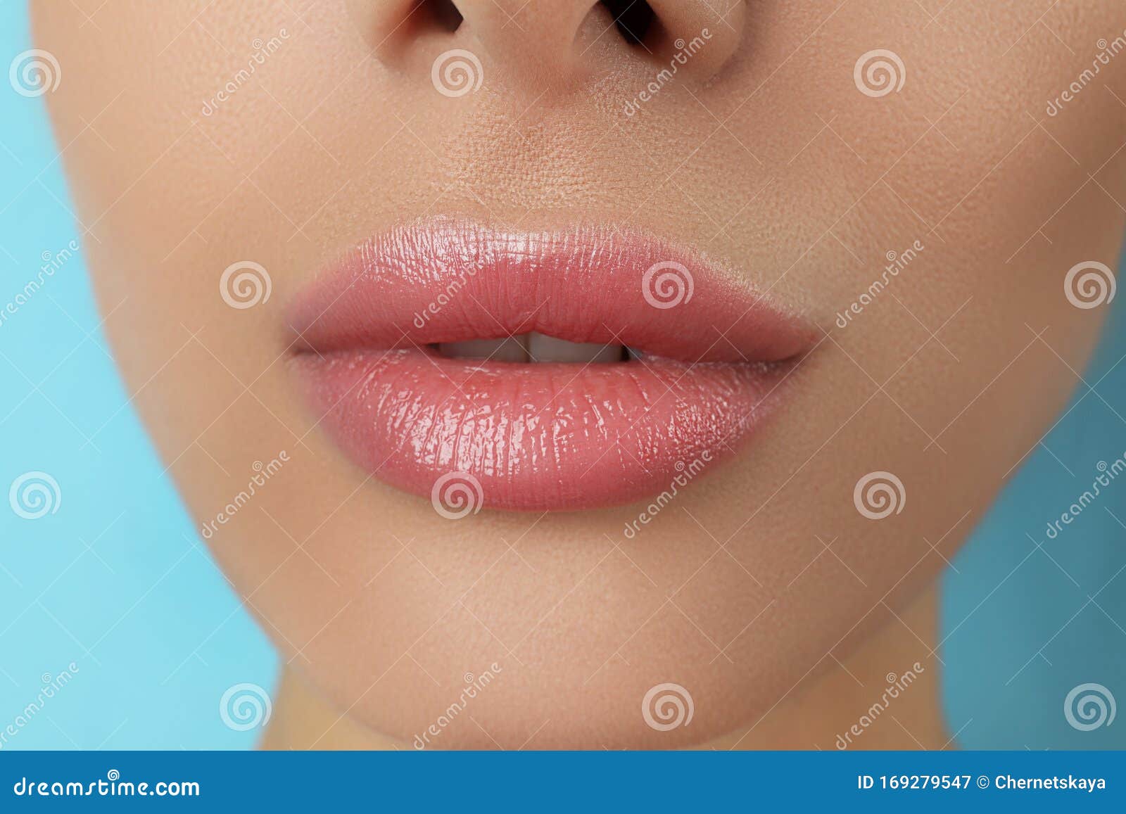 Woman with Beautiful Full Lips on Light Blue, Closeup Stock Image ...