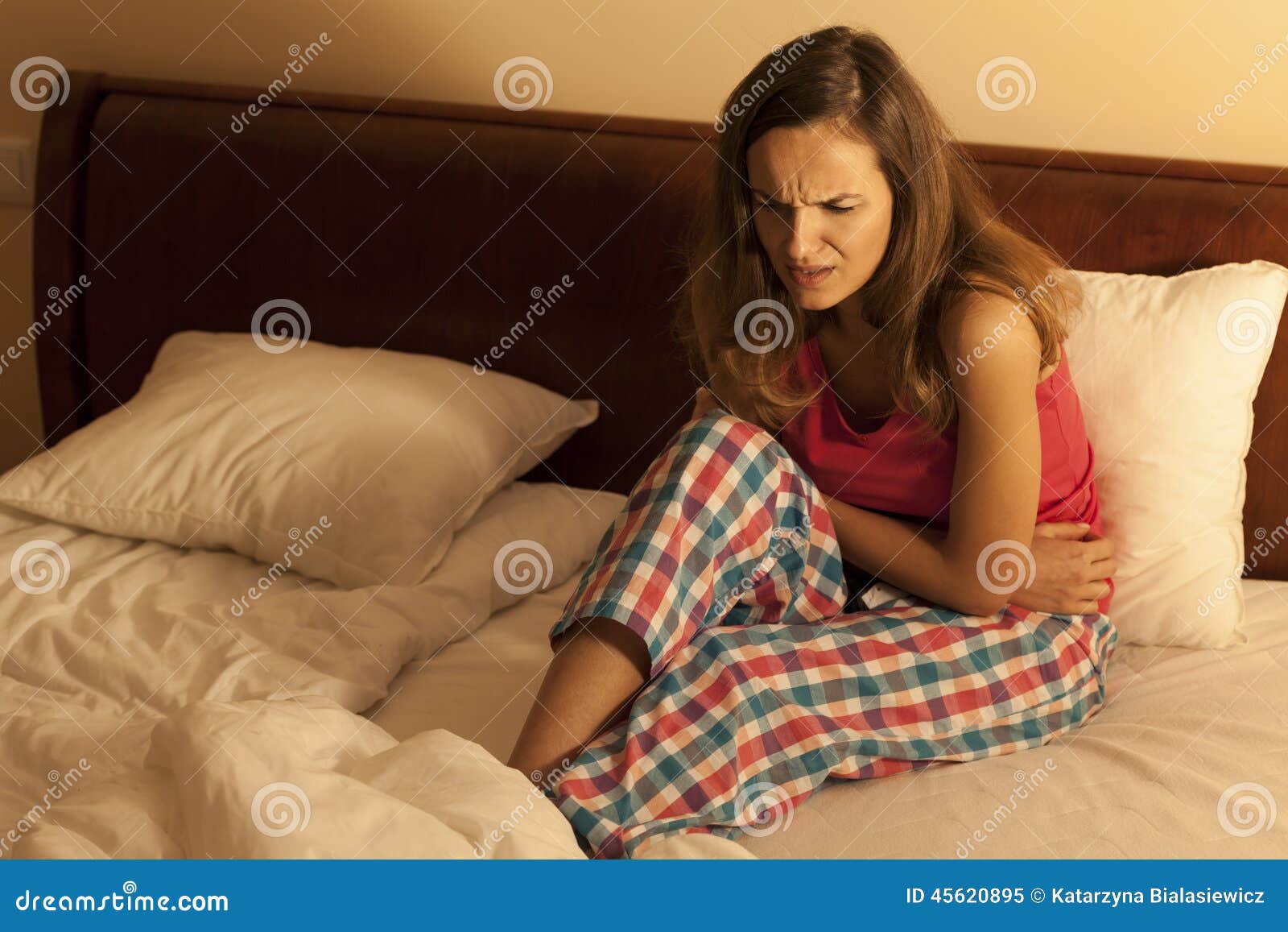 Woman in Bed Having Abdominal Cramps Stock Image - Image of pain ...