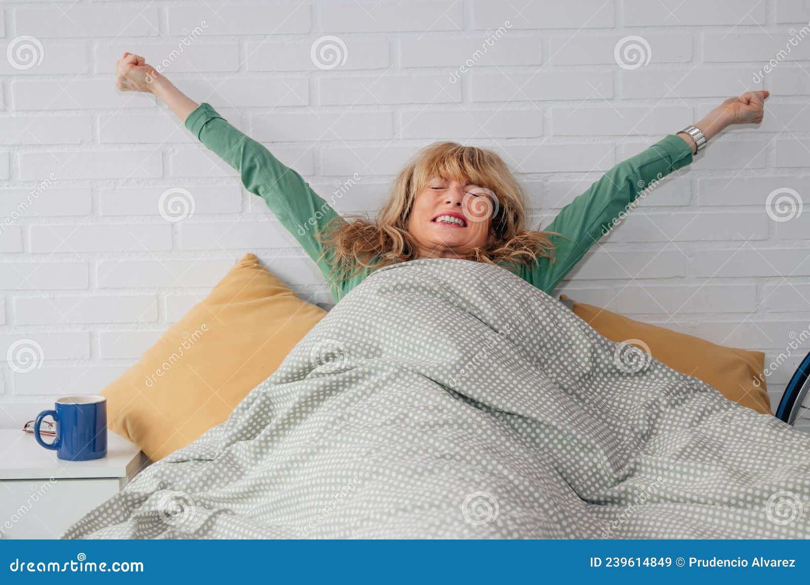 Woman in bed waking up stock image. Image of relaxing - 239614849