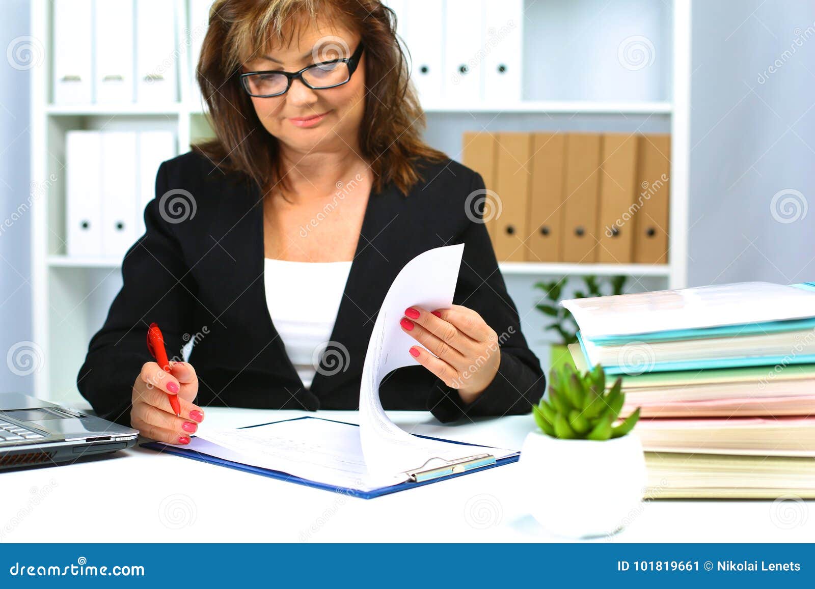 The Woman Behind the Desk in the Office Stock Image - Image of ...