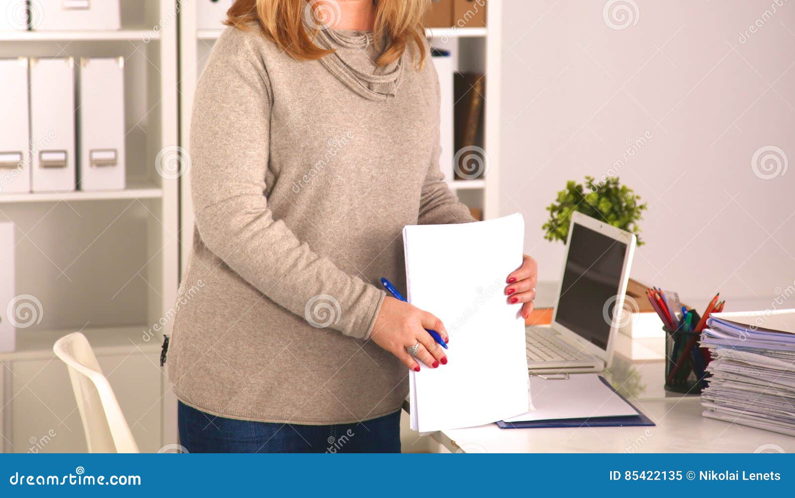 The Woman Behind the Desk in the Office Stock Image - Image of female ...