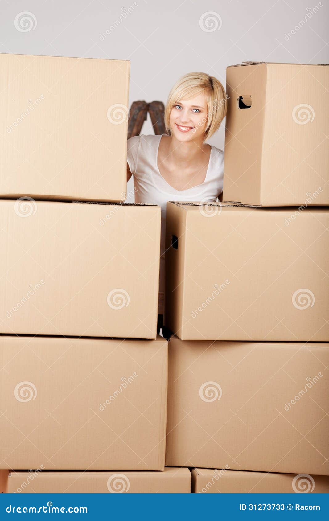 Woman Behind Stack of Cardboard Boxes Stock Image - Image of looking ...