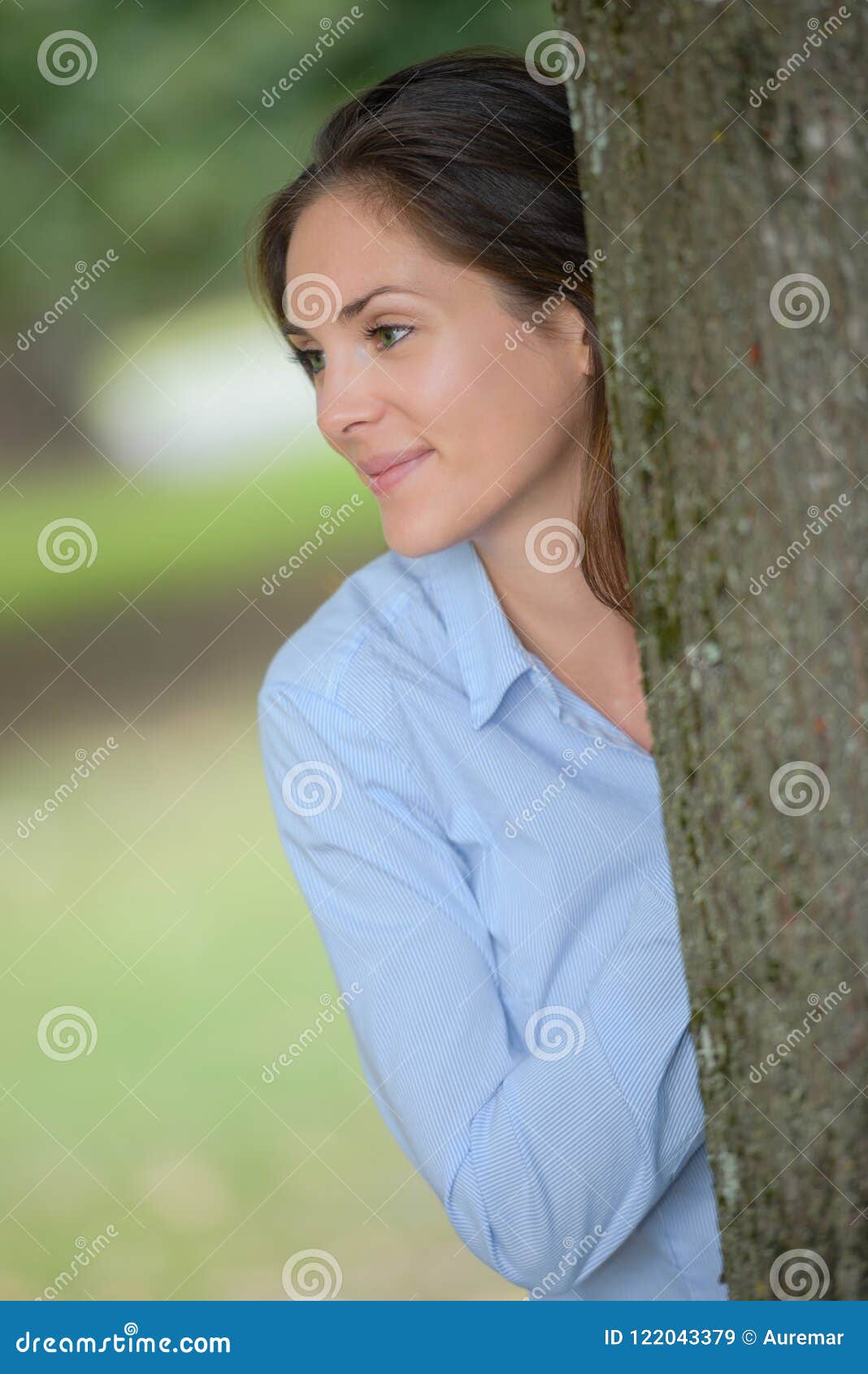 Woman behind a tree stock image. Image of public, girl - 122043379