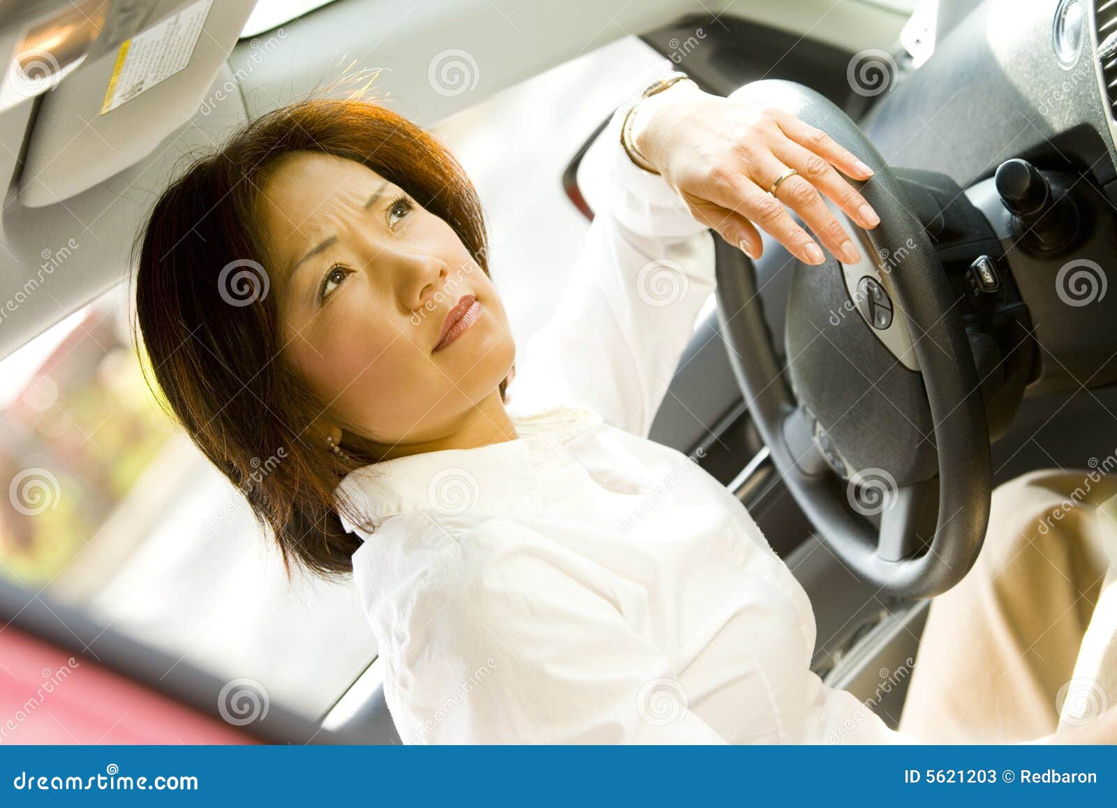 Woman behind wheel of car stock image. Image of feminine - 5621203