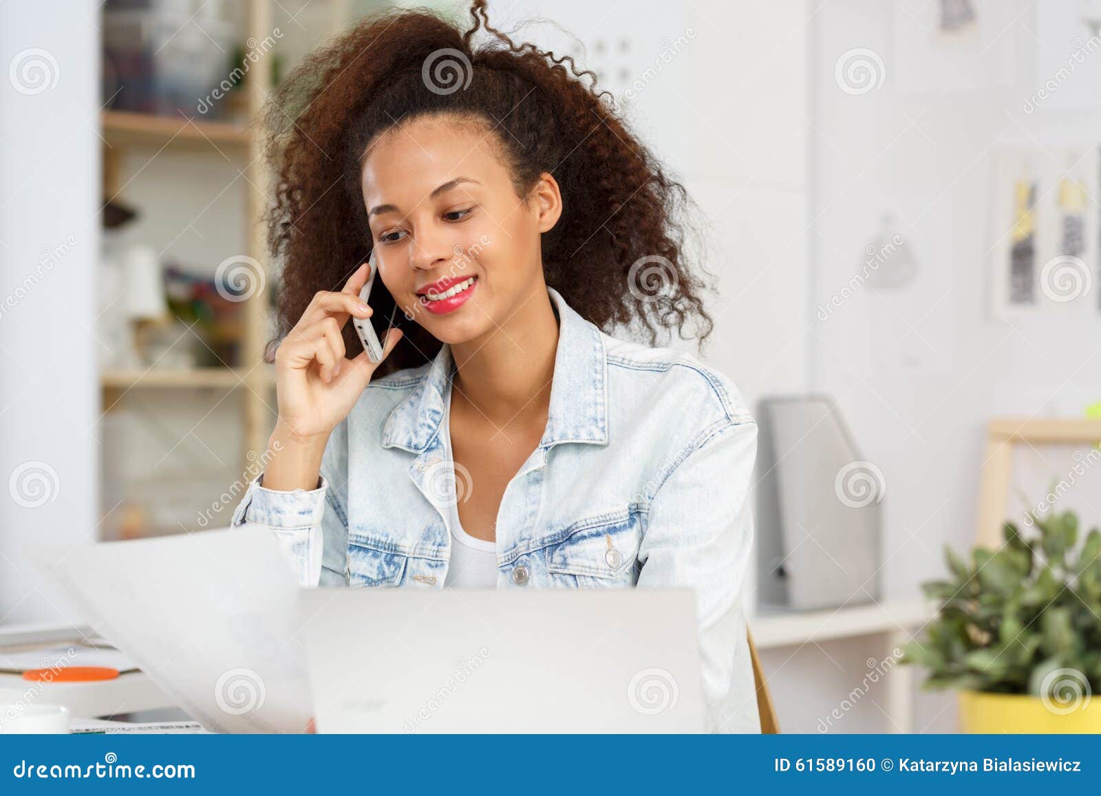 Woman being on the phone stock photo. Image of designing - 61589160