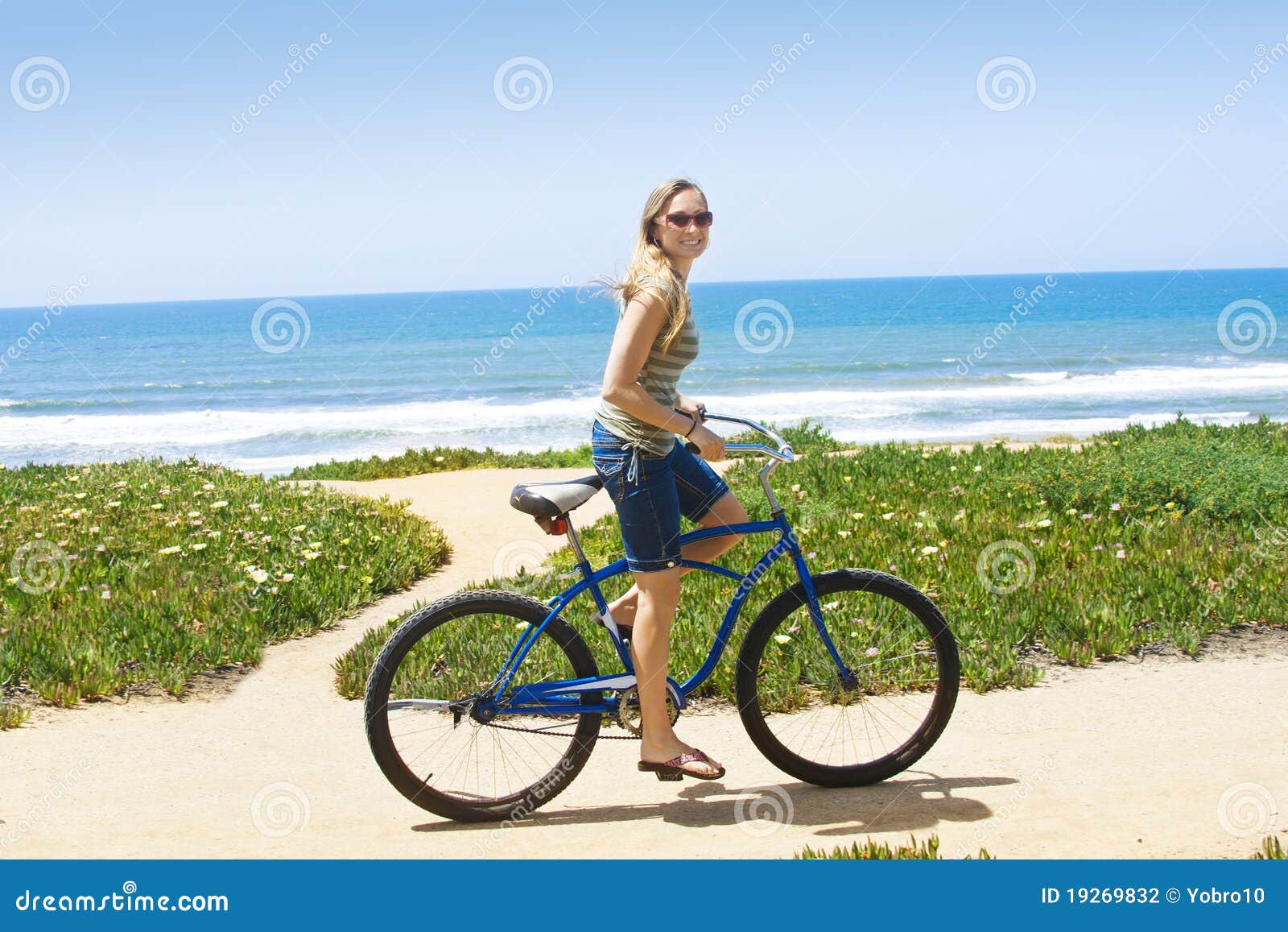 Woman on a Bicycle Ride Along the Beach Stock Photo - Image of ...
