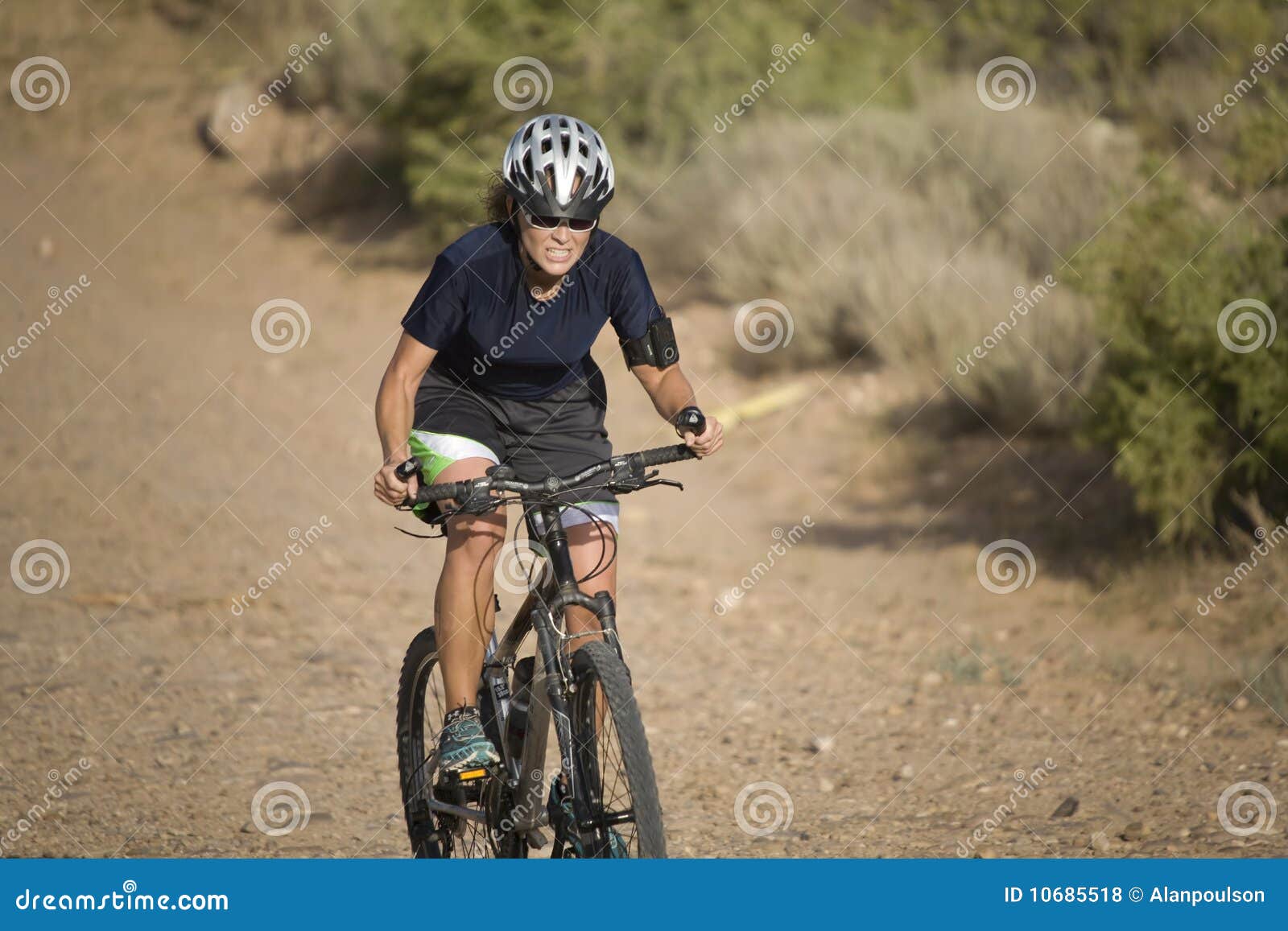 Woman on Bike climbing stock photo. Image of active, road - 10685518