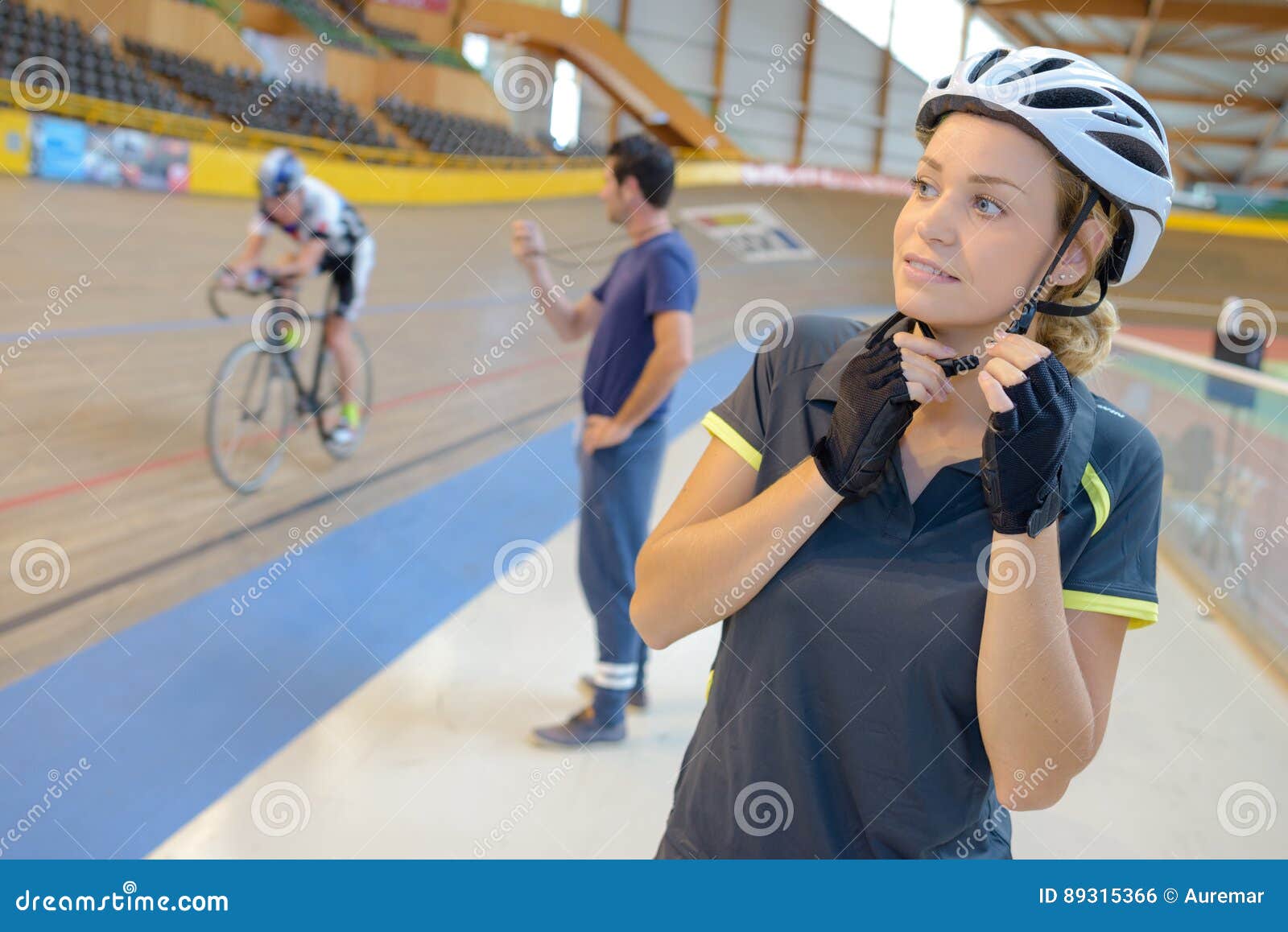 Woman biker putting helmet stock photo. Image of fitness - 89315366