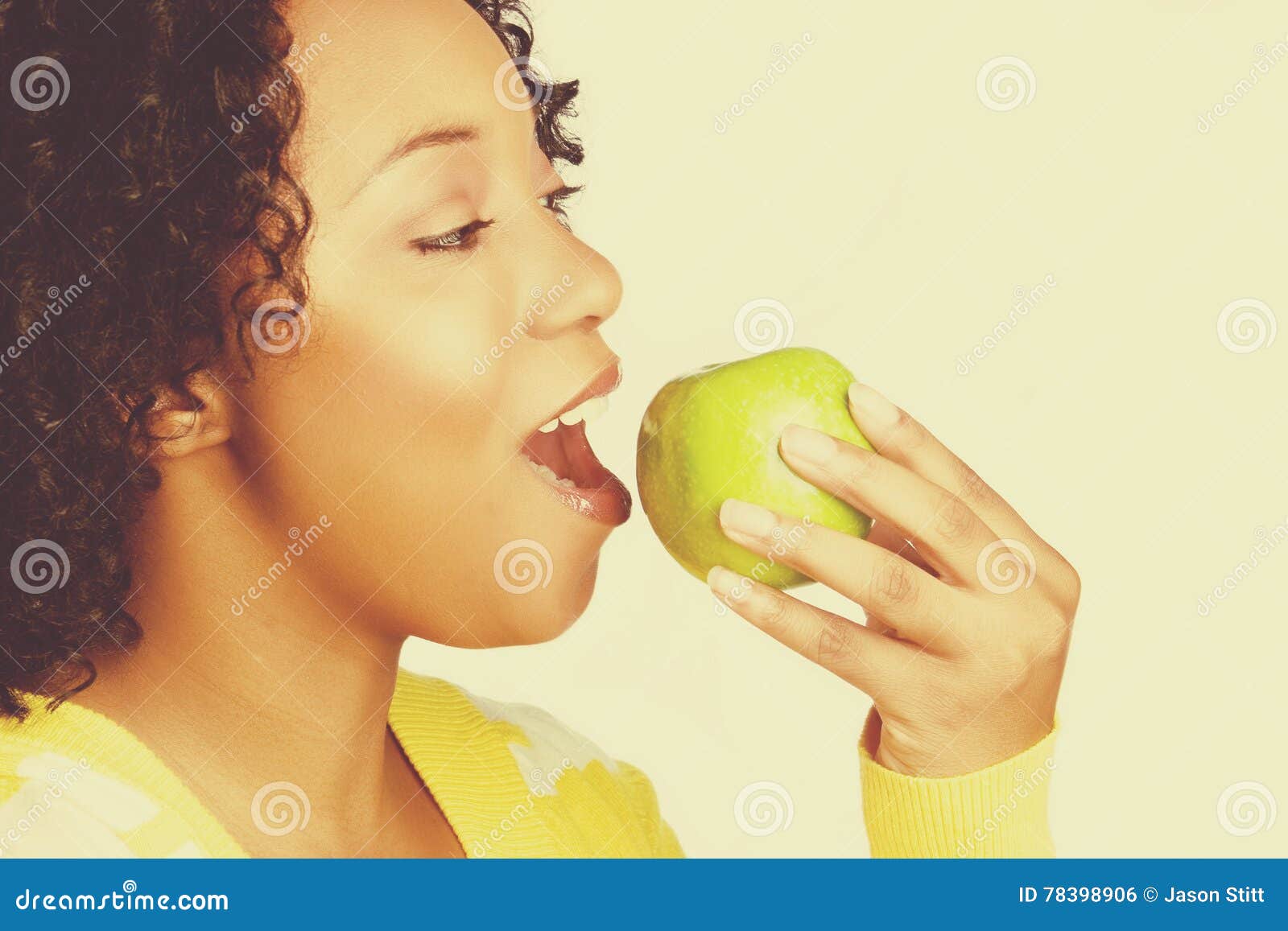 Woman Biting Apple stock photo. Image of ethnicity, instagram - 78398906