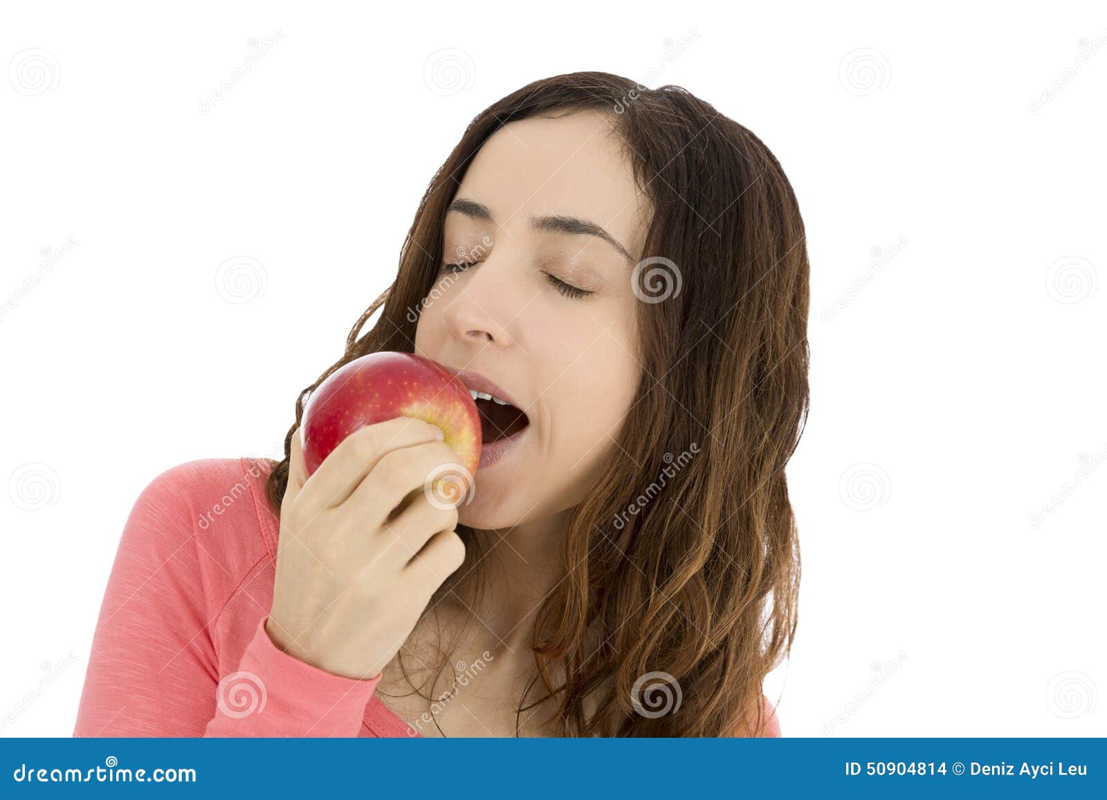 Woman biting an apple stock photo. Image of beautiful - 50904814