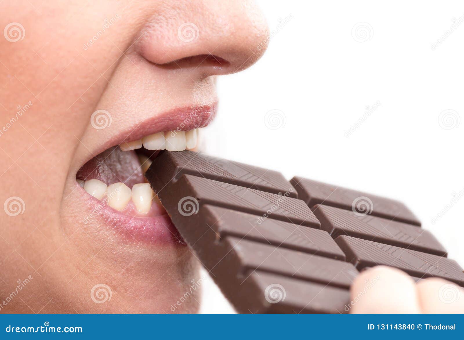 Woman Biting in a Chocolate Bar Stock Photo - Image of sweet, bite ...