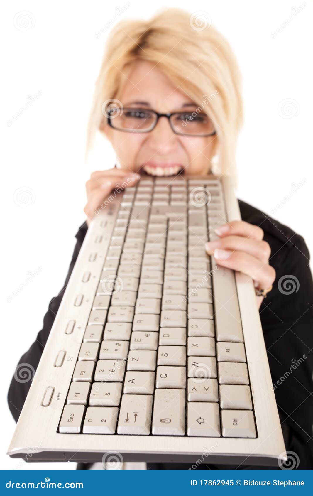 Woman biting keyboard stock image. Image of camera, looking - 17862945
