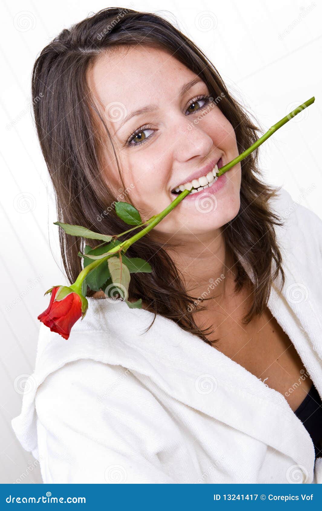 Woman biting rose stock image. Image of woman, smiling - 13241417