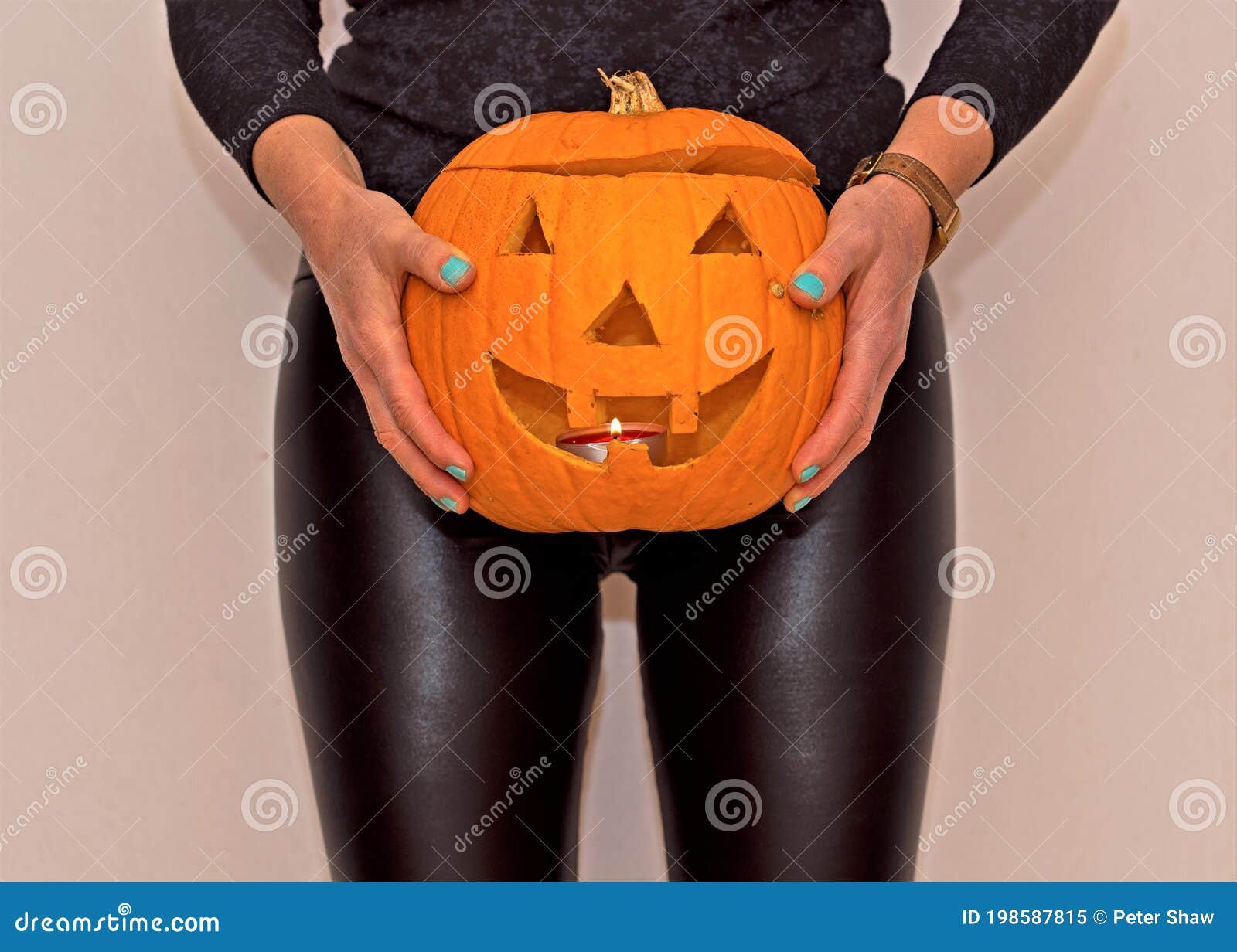 Woman In Black Carrying A Halloween Pumpkin Stock Image Image Of England Face 198587815