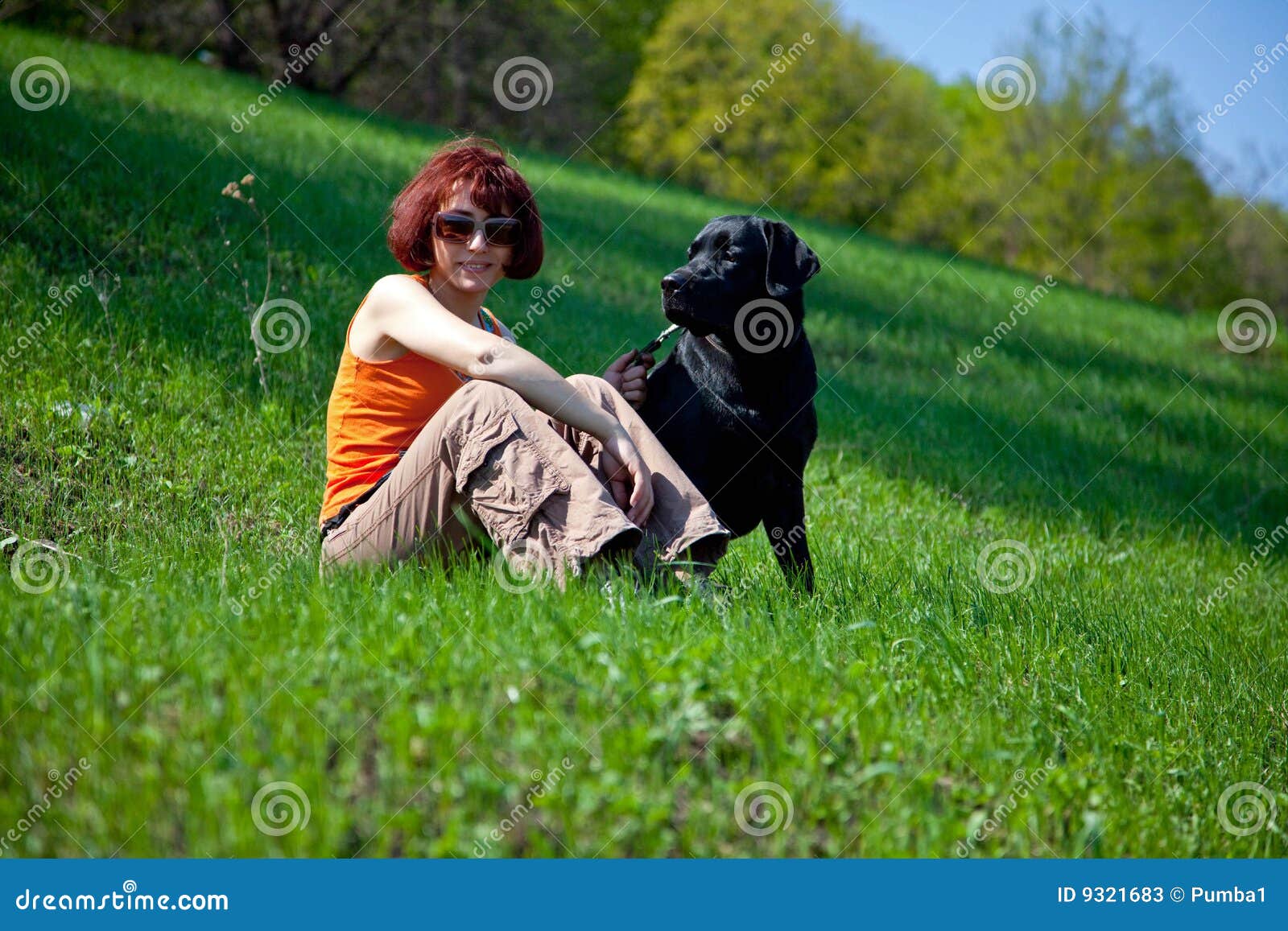 The Woman With Black Labrador Picture. Image: 9321683