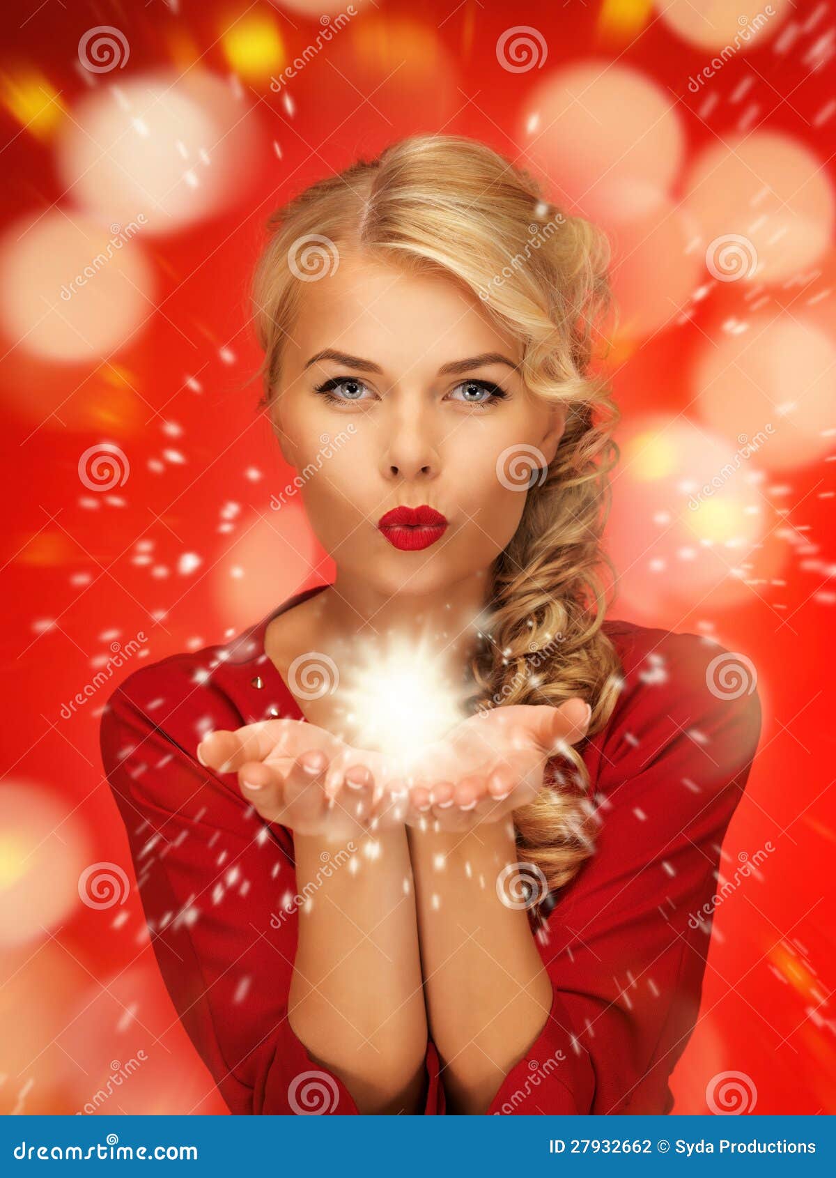 Woman Blowing Magic on the Palms of Her Hands Stock Photo - Image of ...