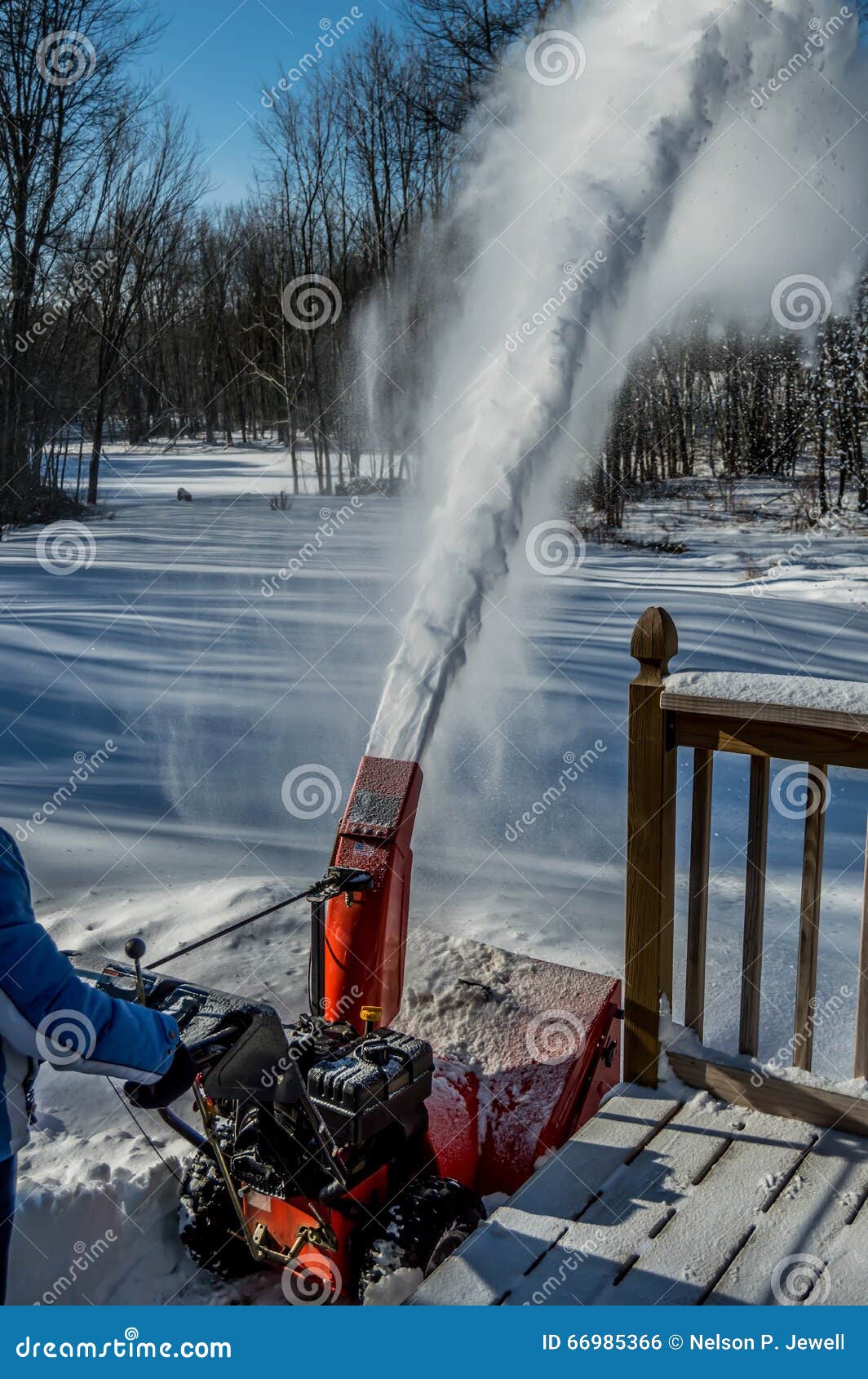 Woman Blows Snow after Storm Stock Photo - Image of snow, covered: 66985366