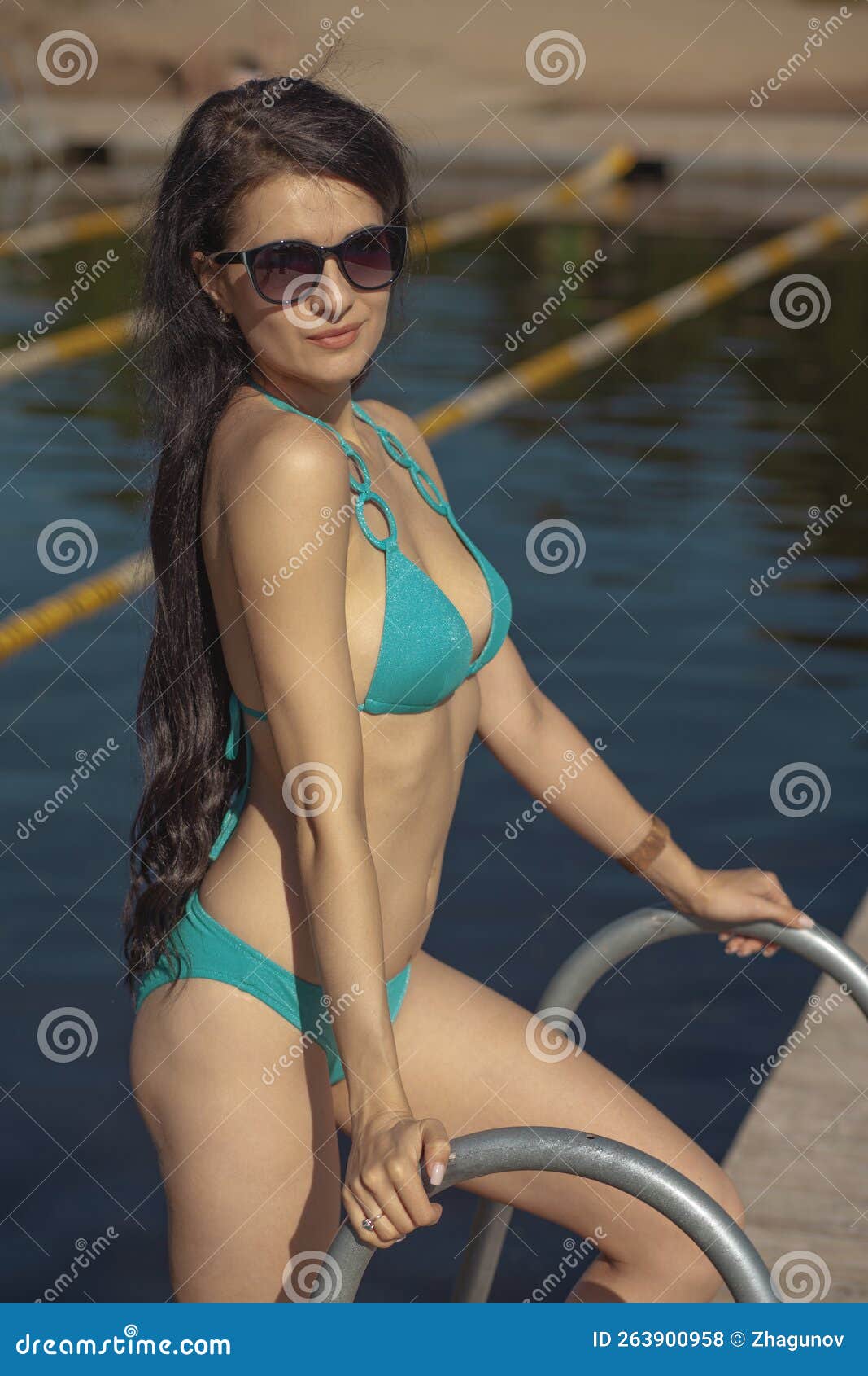 Woman in a Blue Bikini by the Pool Stock Photo - Image of athletic ...