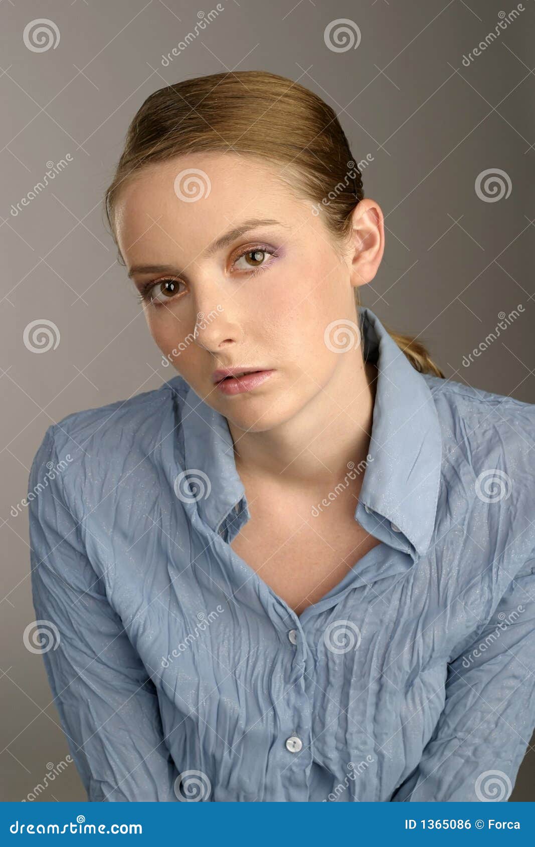 Woman in a blue blouse stock photo. Image of woman, face - 1365086