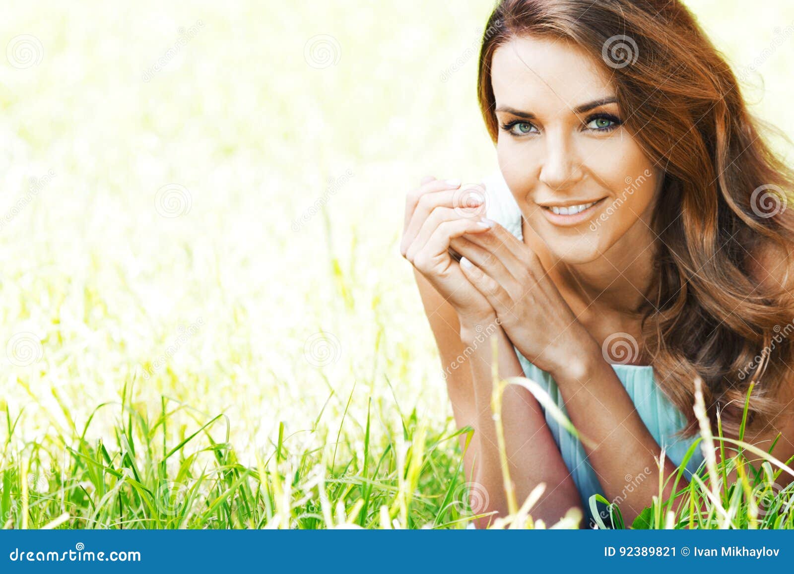 Woman In Blue Dress Lying On Grass Stock Image Image Of Nature