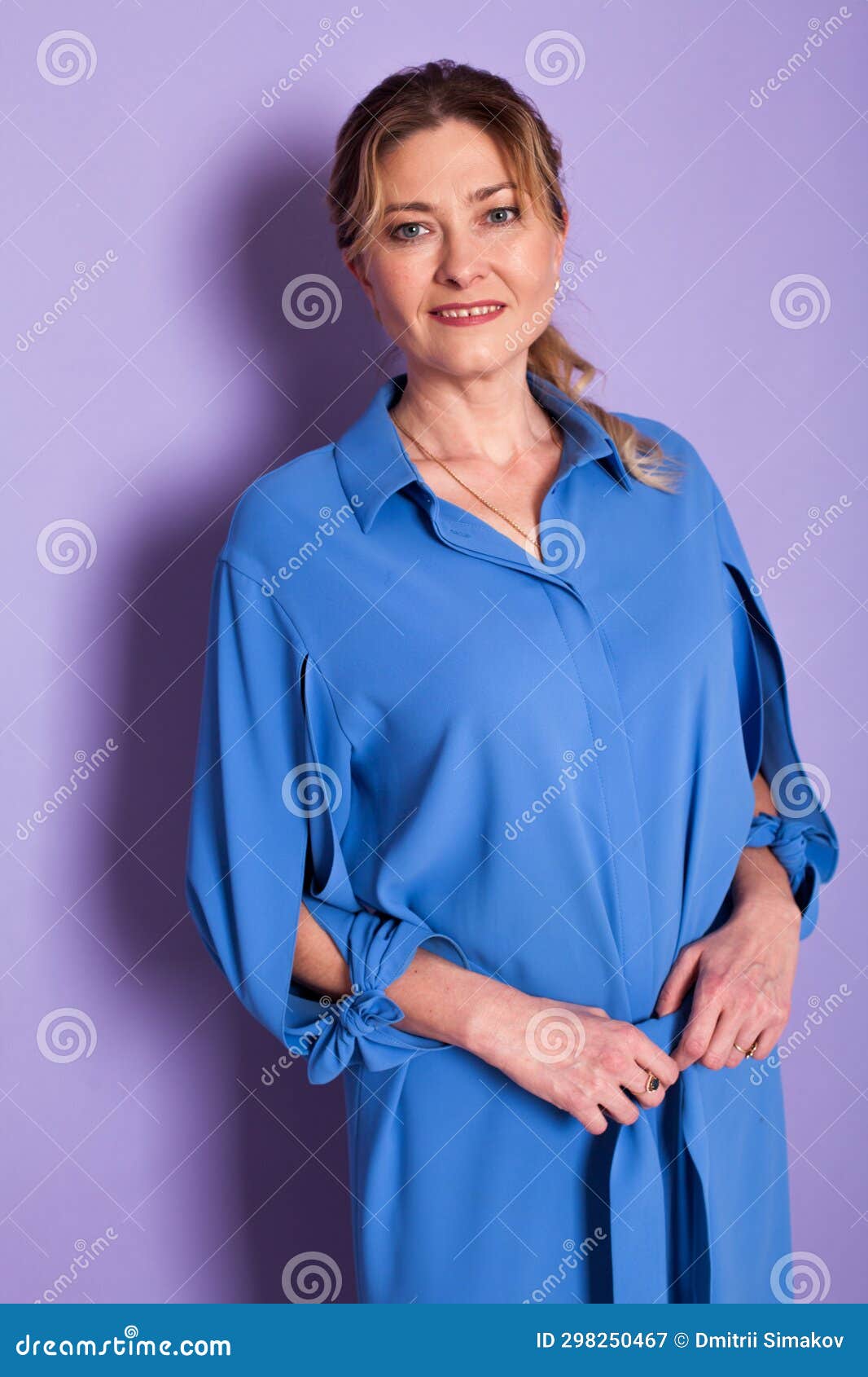 Woman In Blue Dress On Purple Background Stock Image Image Of Lady