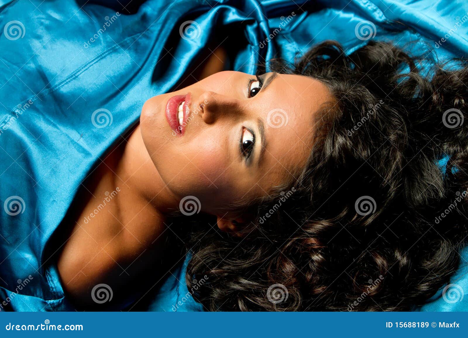Woman with blue satin stock image. Image of studio, ethnic - 15688189