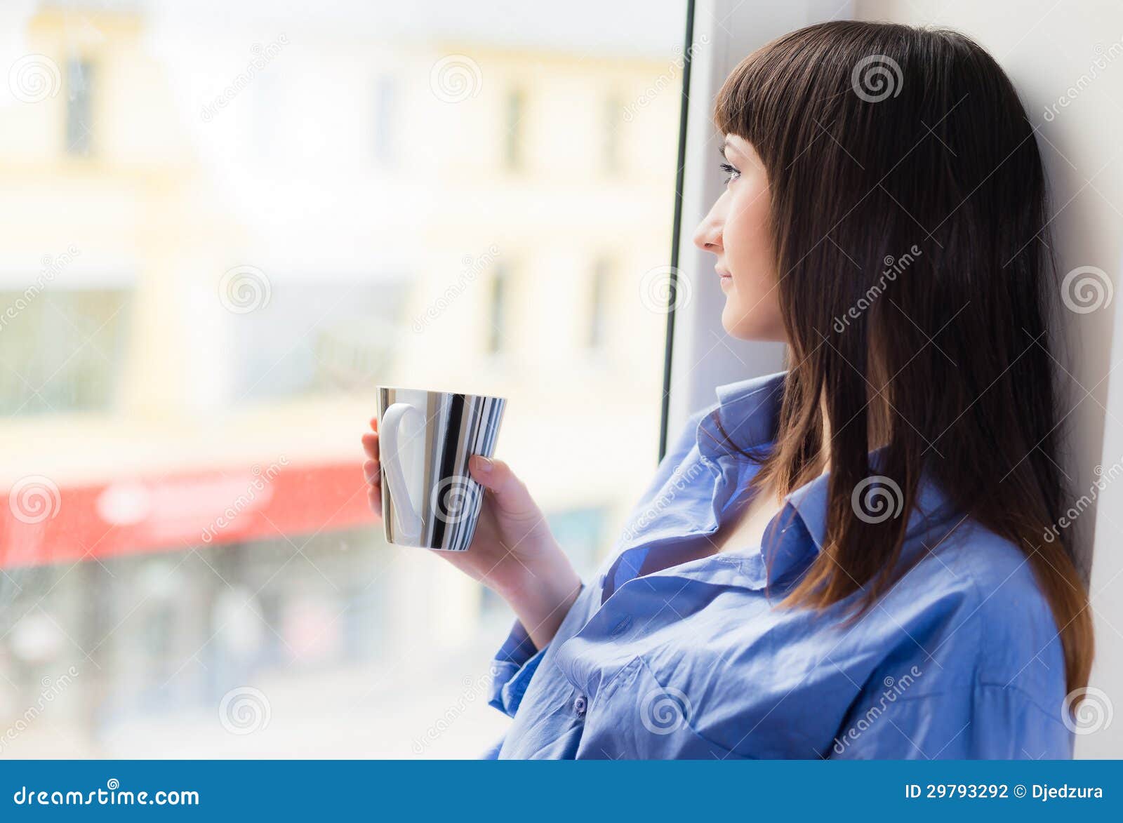 Woman with a Cup of Tea Looking through the Window Stock Photo - Image ...