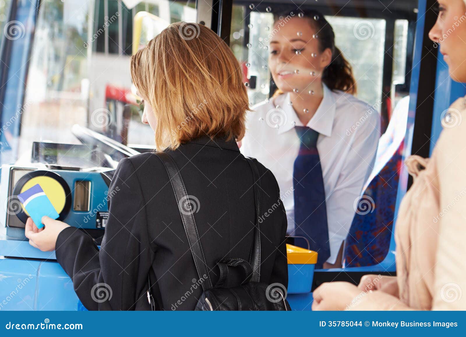 Woman Boarding Bus and Using Pass Stock Photo - Image of person, paying ...