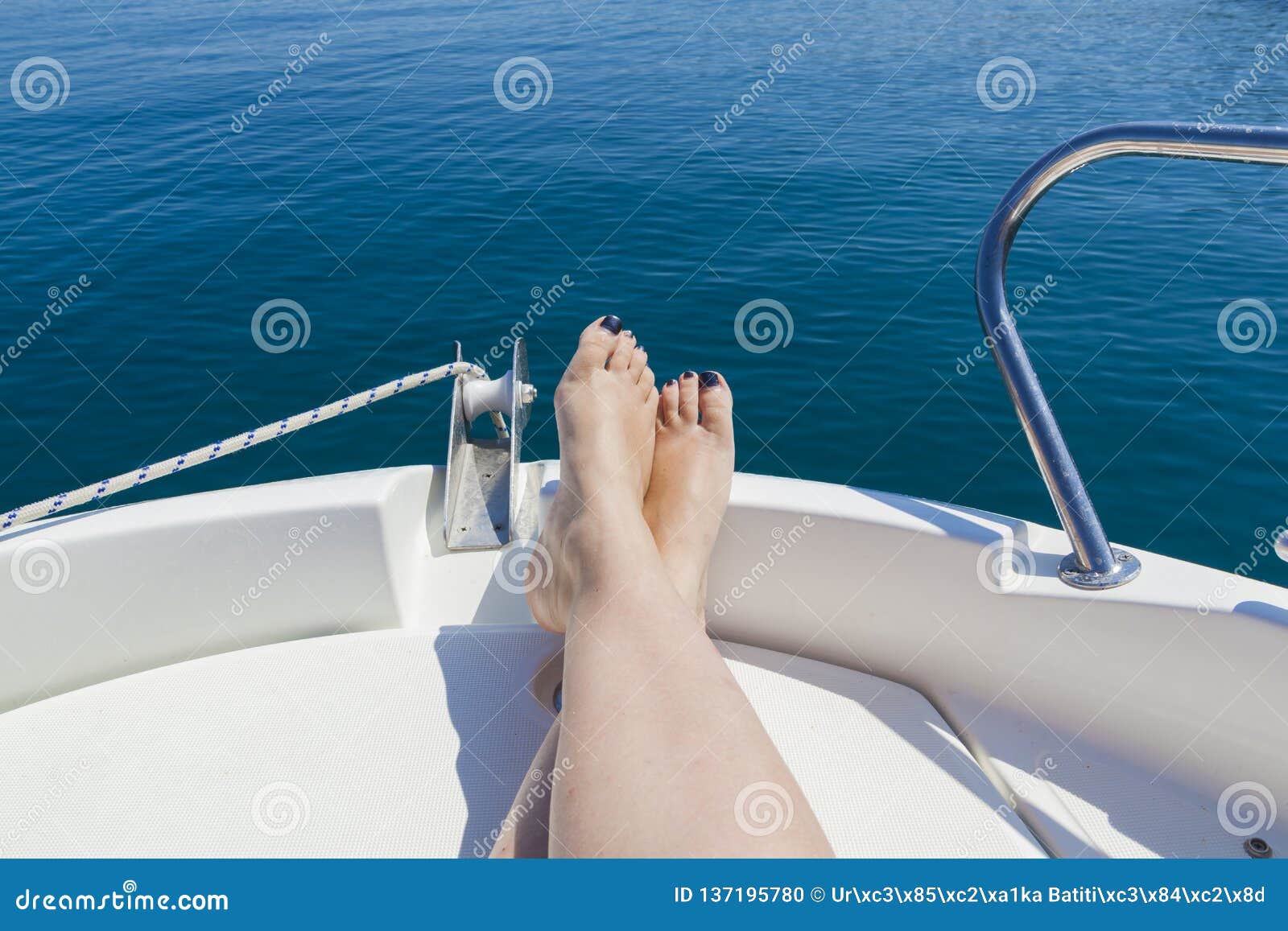 Woman on a boat stock photo. Image of millennial, beach - 137195780
