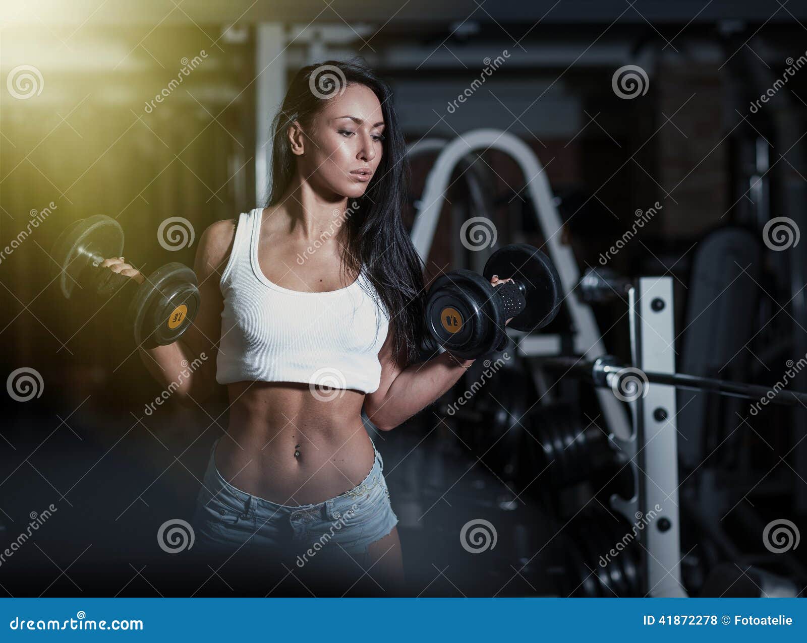 Woman Bodybuilder Training with Dumbbell. Stock Photo - Image of ...