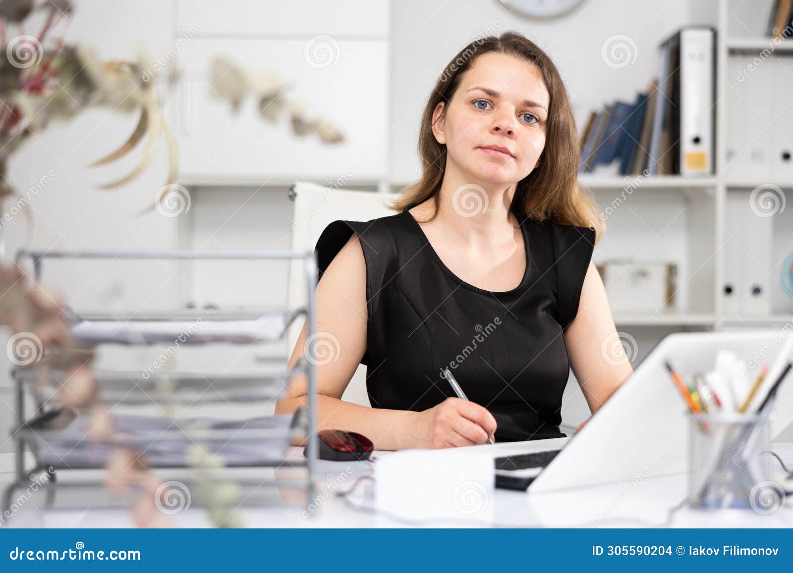 Woman Bookkeeper Writing on Paper in Office Stock Photo - Image of ...