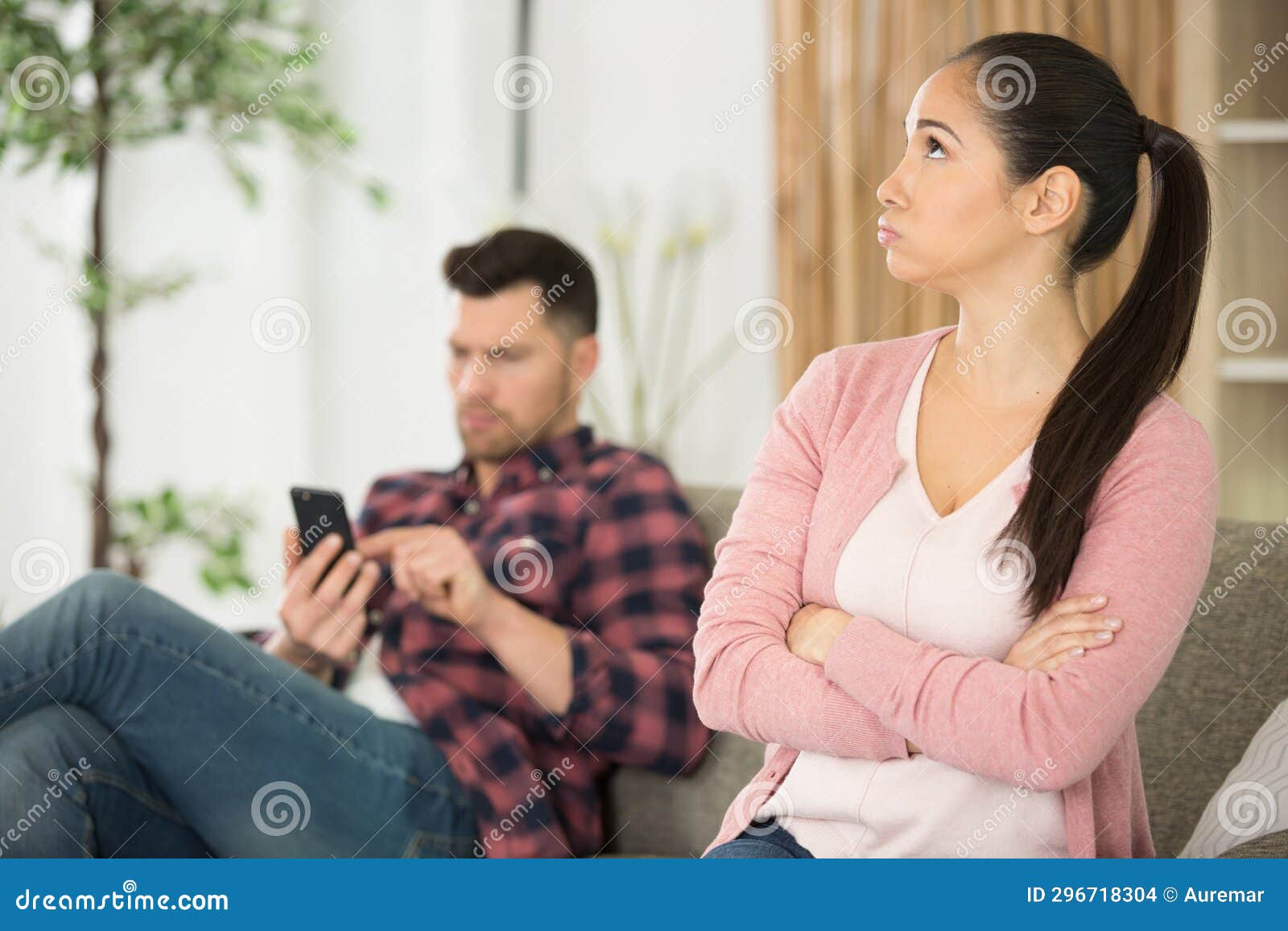 Woman Bored As Man Uses Smartphone Stock Photo - Image of boring ...
