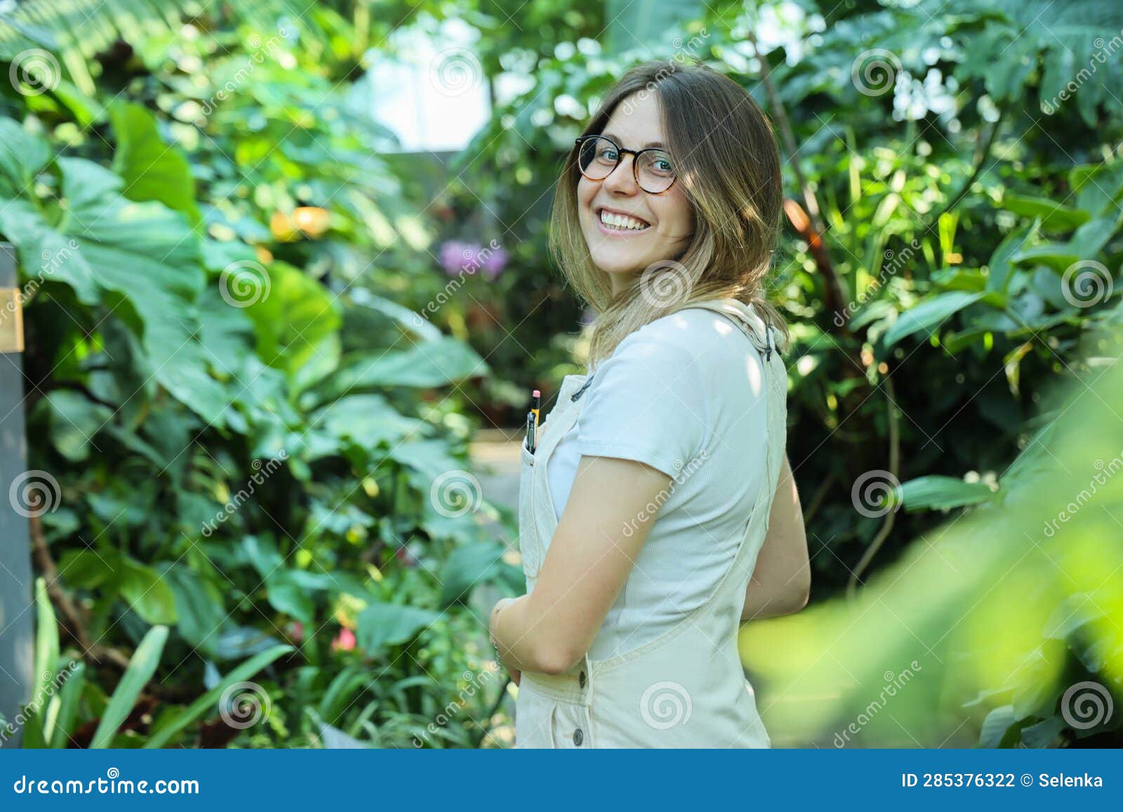 Woman Botanist at Work in a Botanical Garden Stock Photo - Image of ...