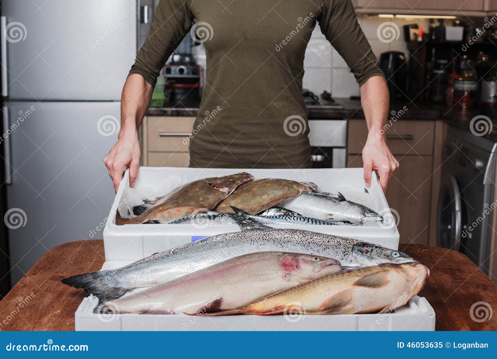Woman with a Box of Fish in Her Kitchen Stock Image - Image of seafood ...
