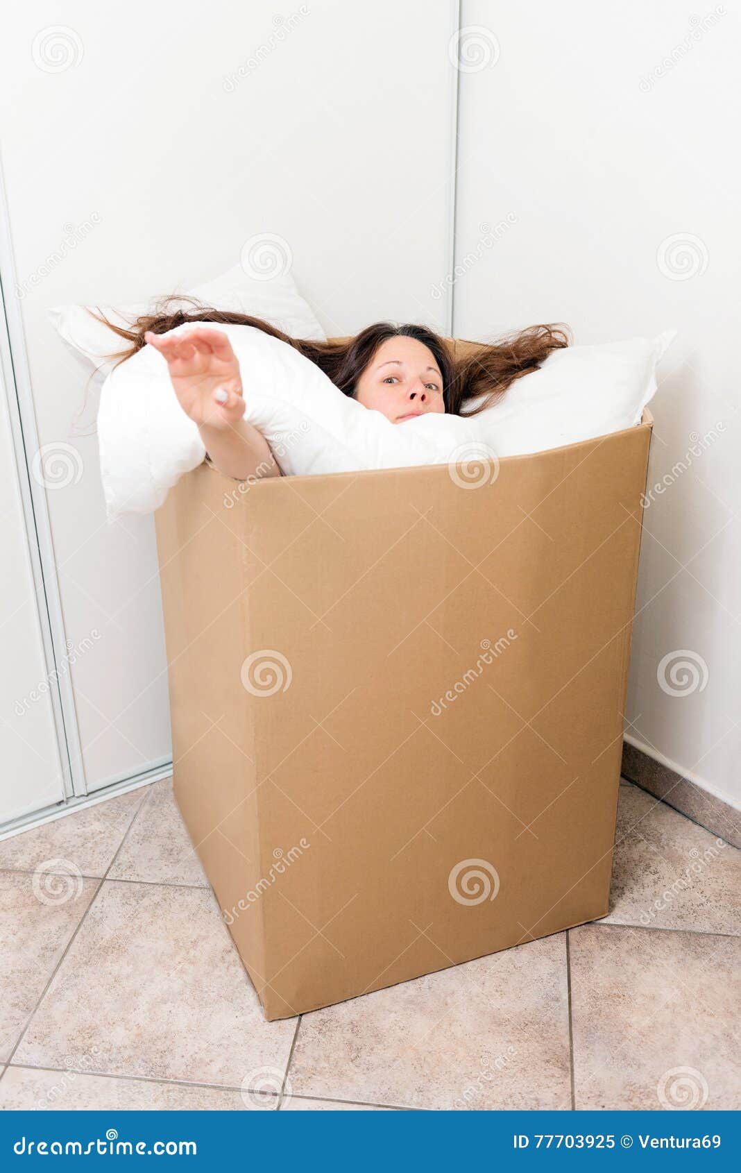 Woman in a box stock image. Image of home, cardboard - 77703925