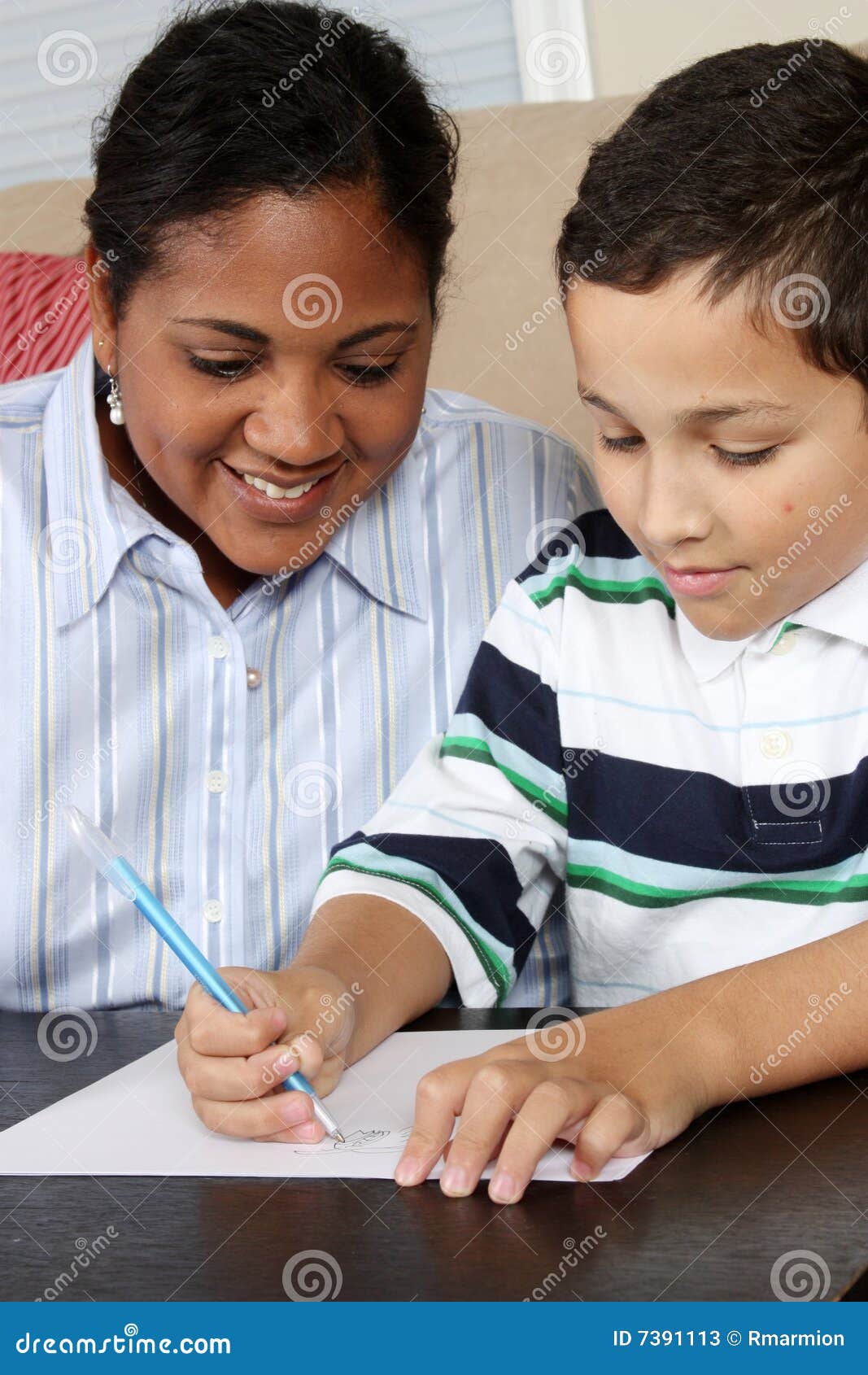 Woman and Boy Writing stock image. Image of pretty, mother - 7391113