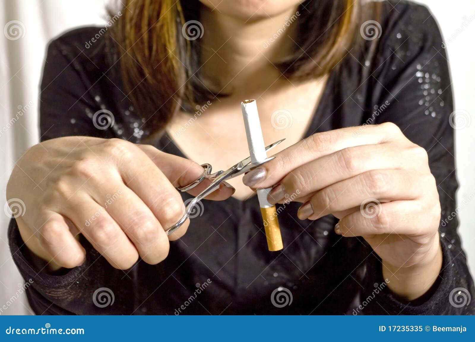 Woman breaking cigarette stock image. Image of danger - 17235335