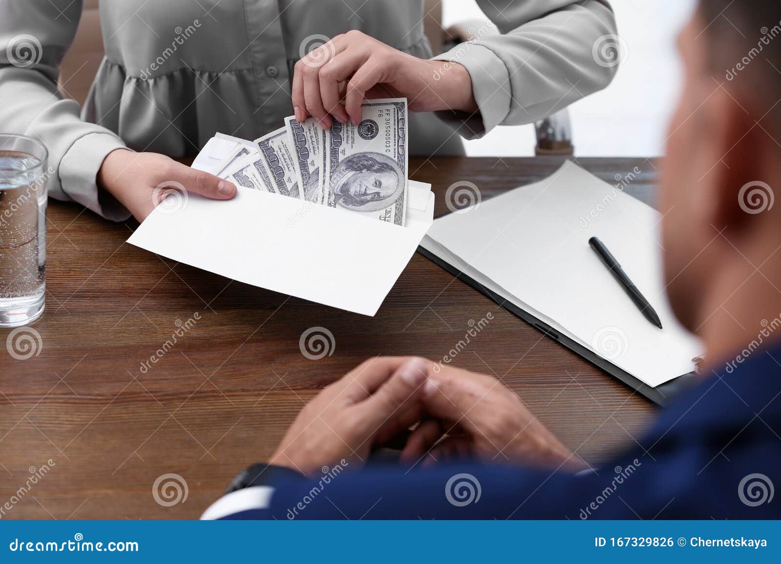 Woman with Bribe Money at Table Stock Photo - Image of employee ...