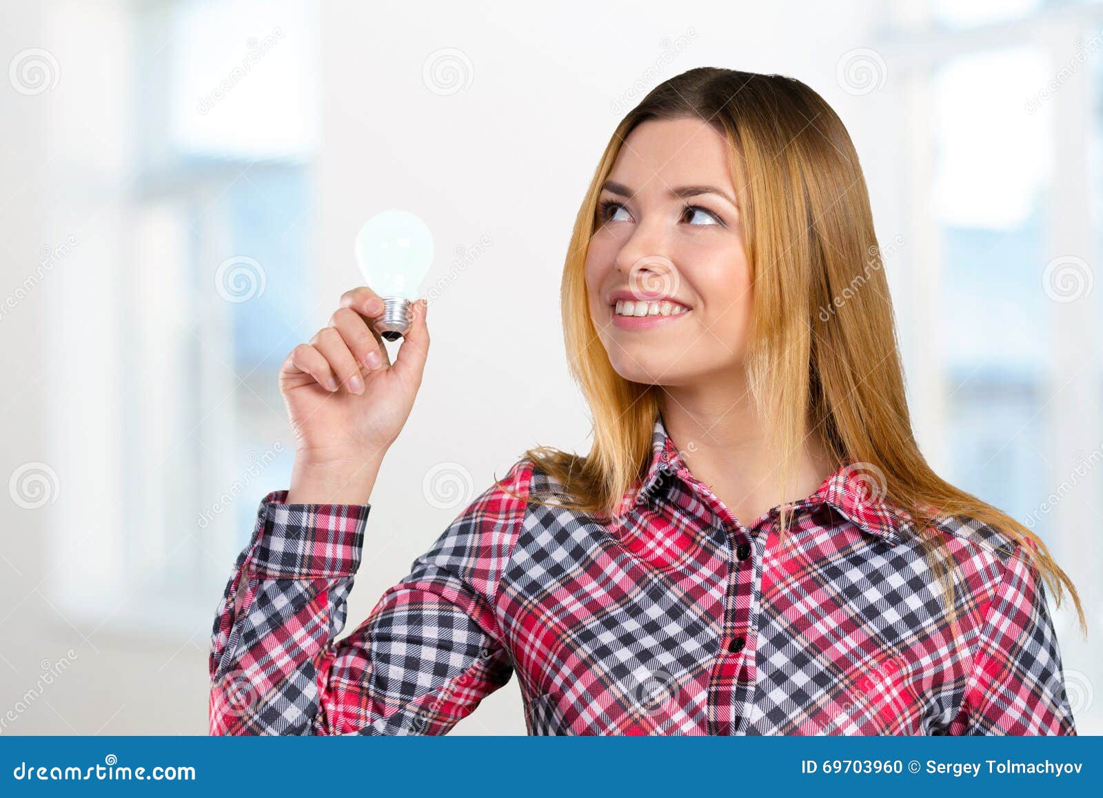 Woman with a bright idea stock photo. Image of person - 69703960