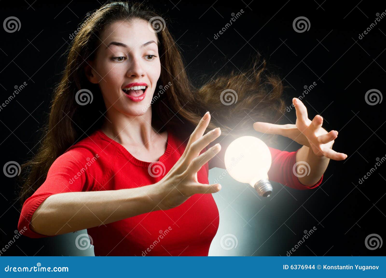Woman and Bright Light Bulb Stock Photo - Image of glowing, power: 6376944